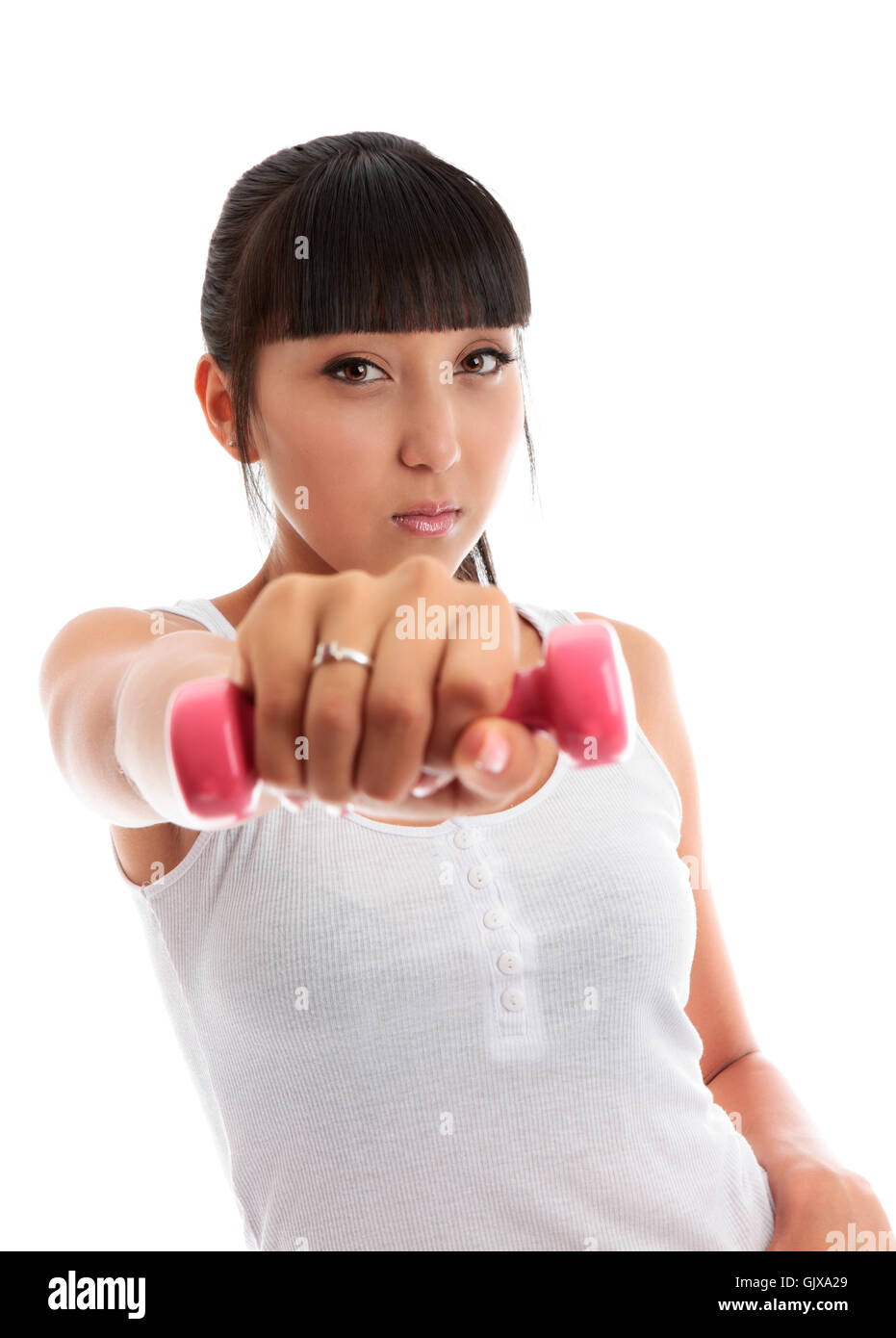 Young woman using hand weights Stock Photo - Alamy