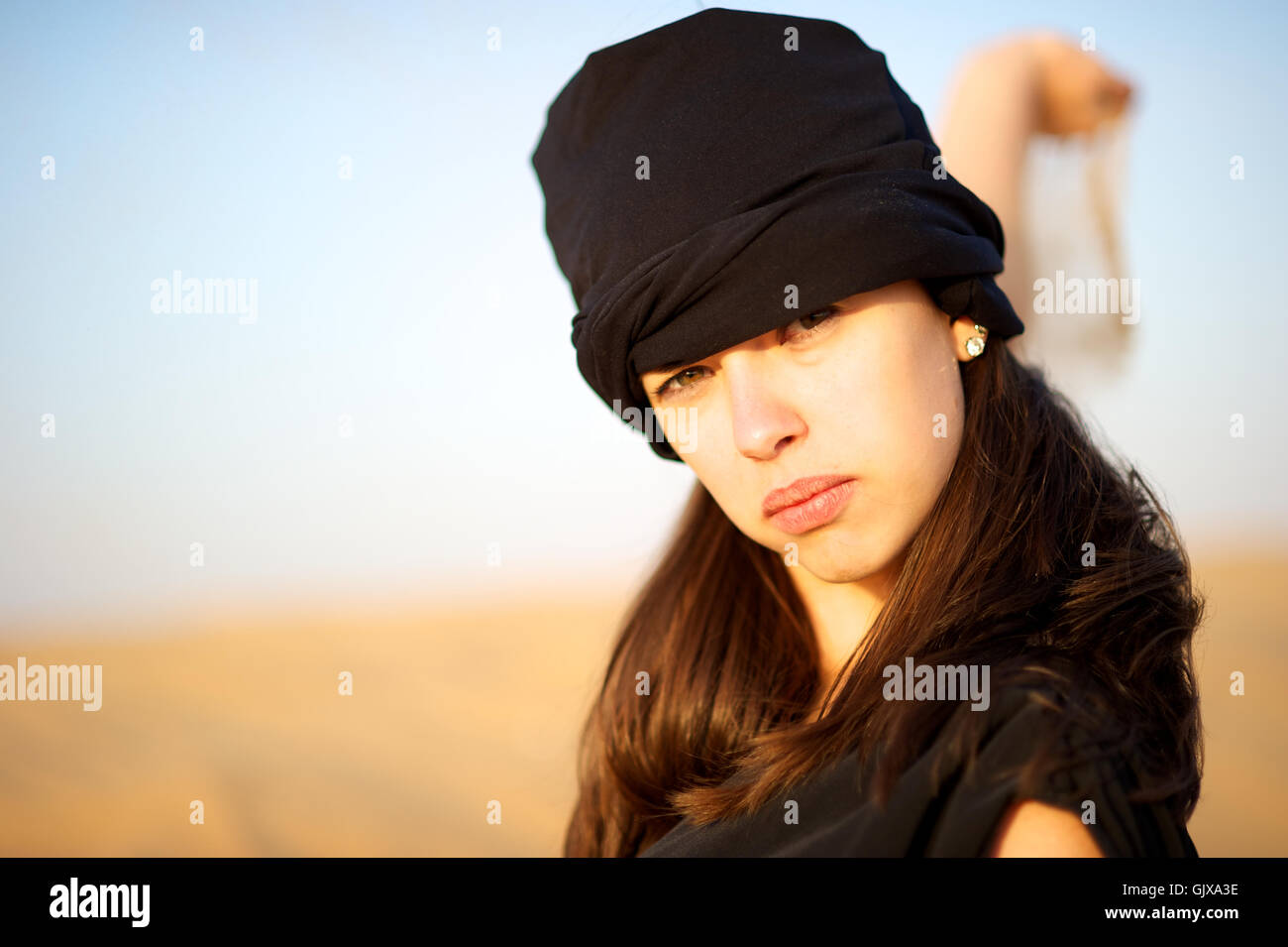 Woman in the desert Stock Photo - Alamy