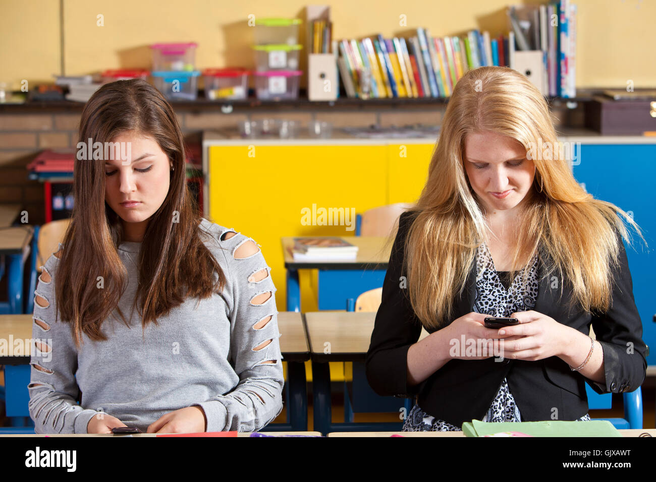Texting in classroom Stock Photo - Alamy