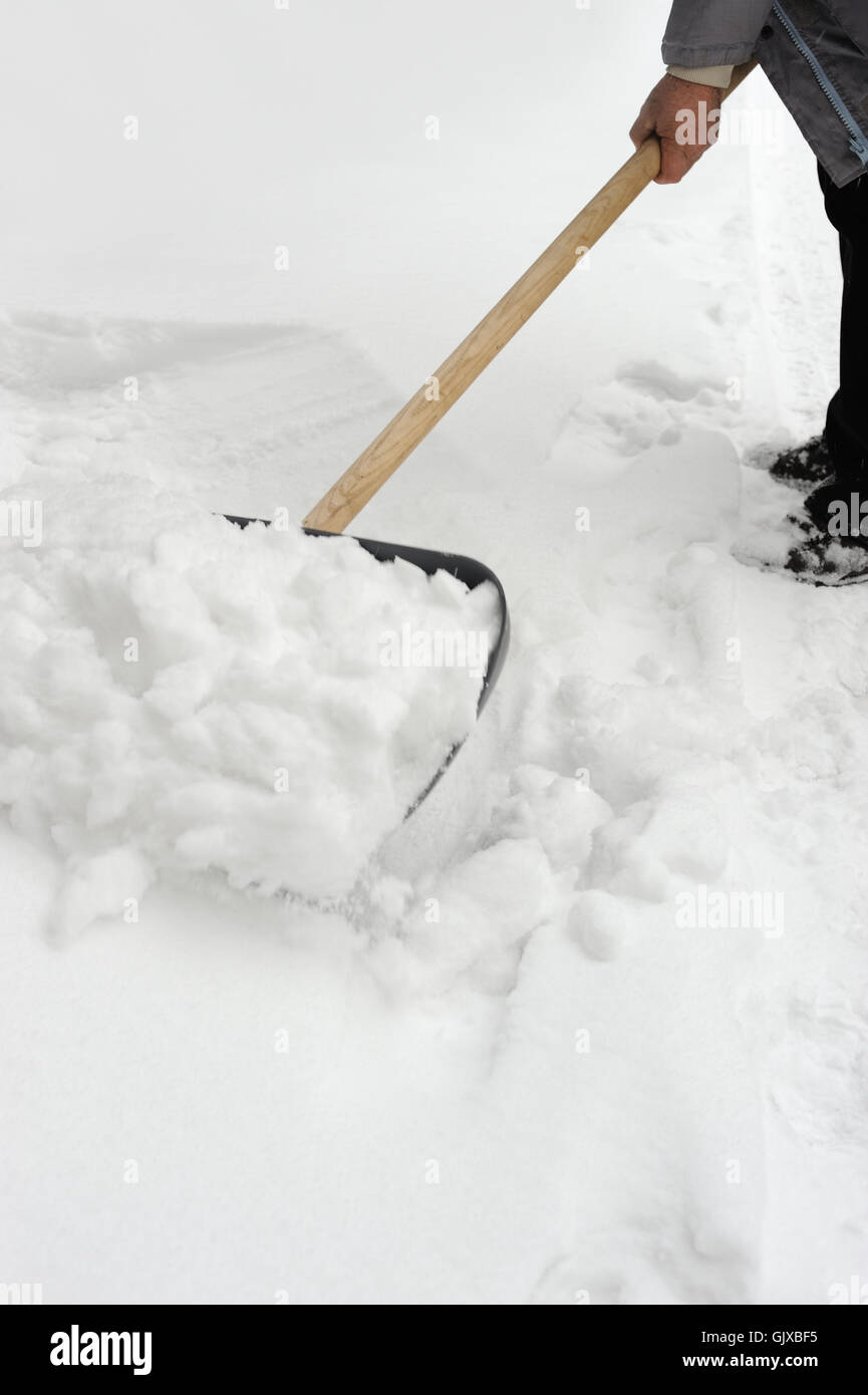 Cleaning of a snow Stock Photo - Alamy