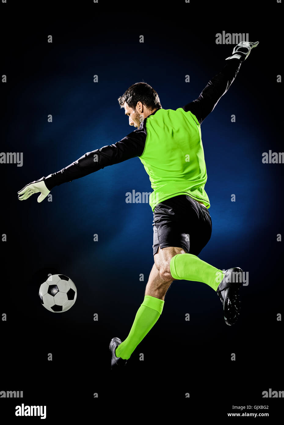 one caucasian goalkeeper soccer man isolated on black background Stock ...