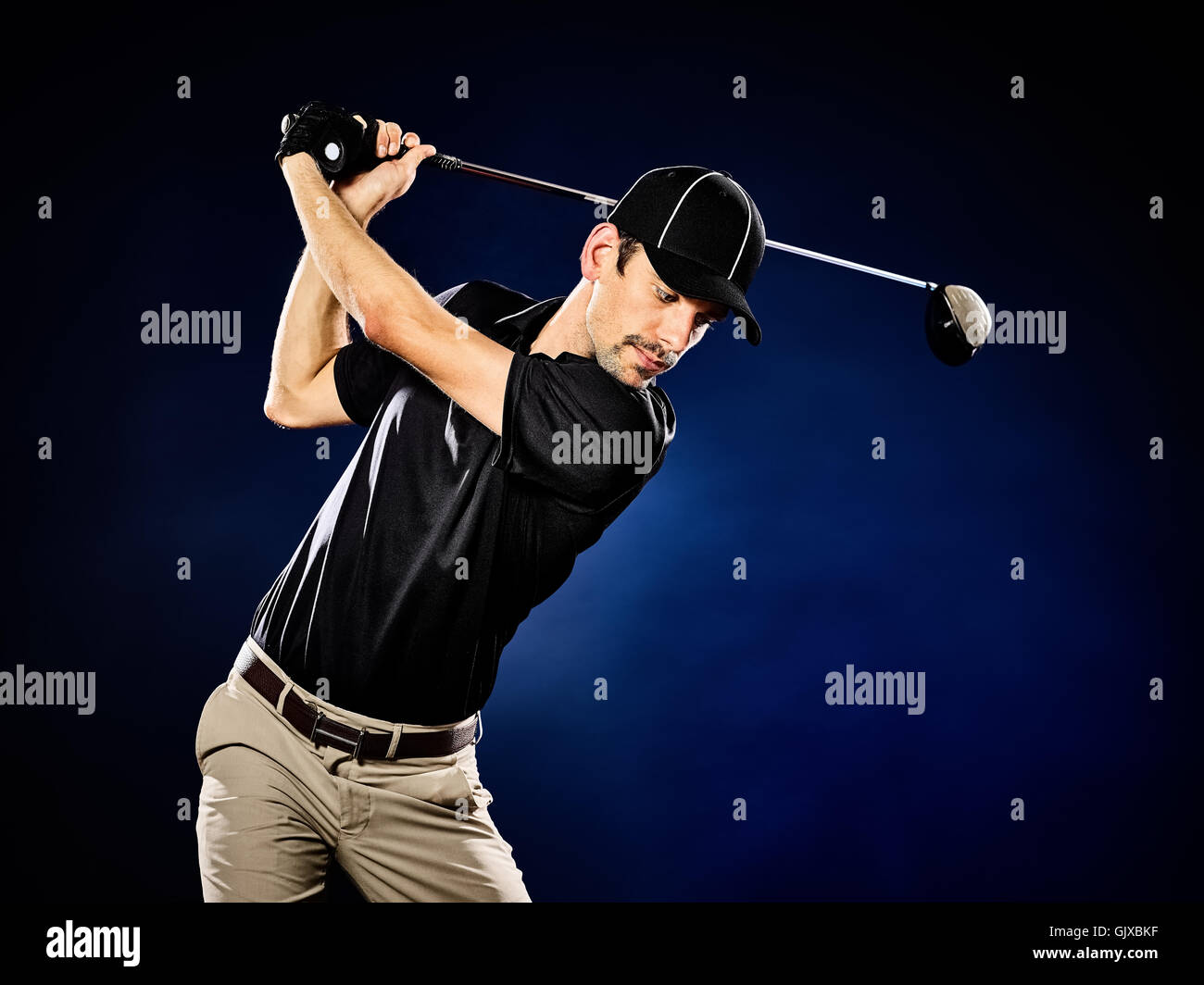 one caucasian man golfer golfing isolated Stock Photo - Alamy