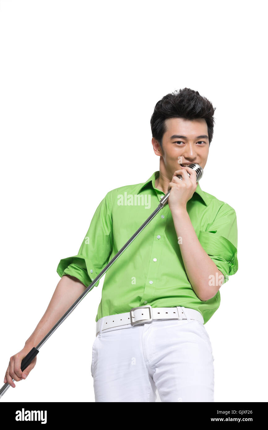 Fashion studio shot of young men singing and dancing Stock Photo - Alamy