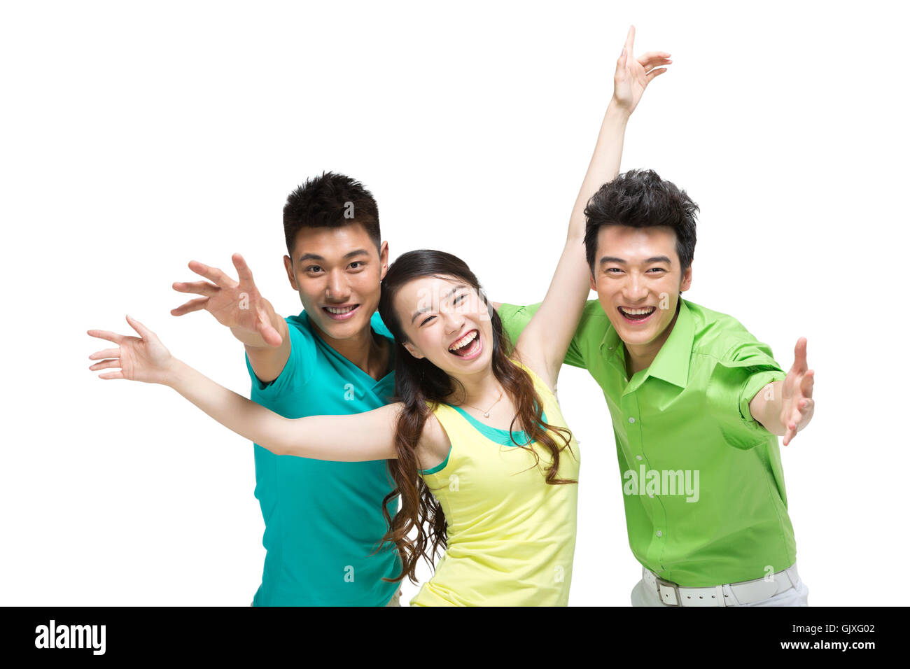 Studio shot fashion young people dancing Stock Photo - Alamy