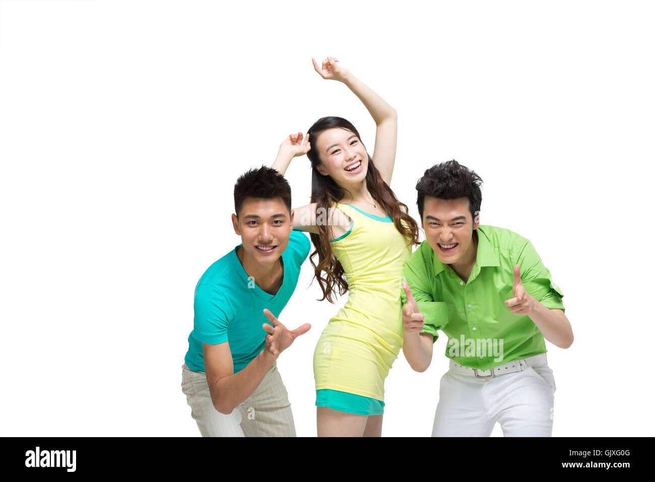 Studio shot fashion young people dancing Stock Photo - Alamy