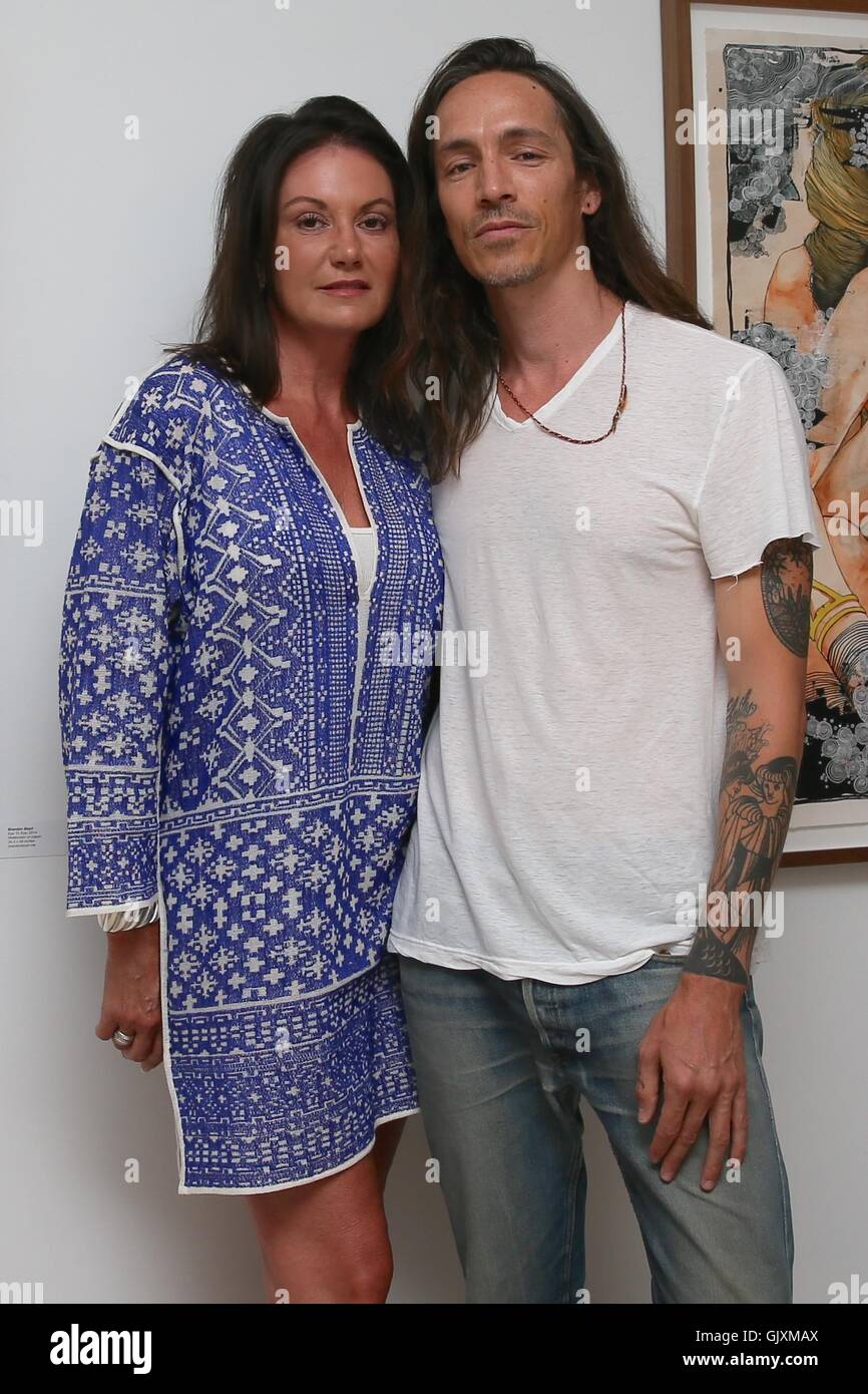 Brandon Boyd seen posing next to his artwork at the Paradise House ...