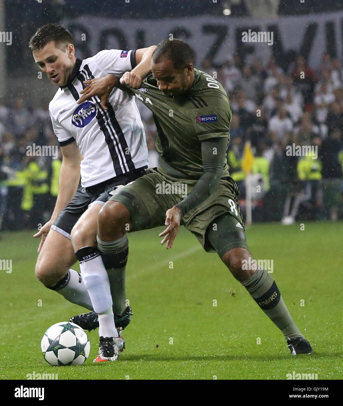 Dundalk's Patrick McEleney and Legia Warsaw's Nemanja Nikolic battle ...