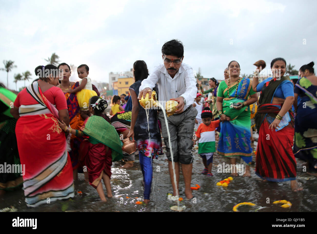 Mumbai, India. 17th Aug, 2016. Koli community prays to the sea god on ...