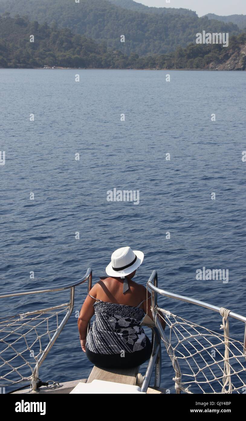 An english lady relaxing while on a boat trip Stock Photo - Alamy