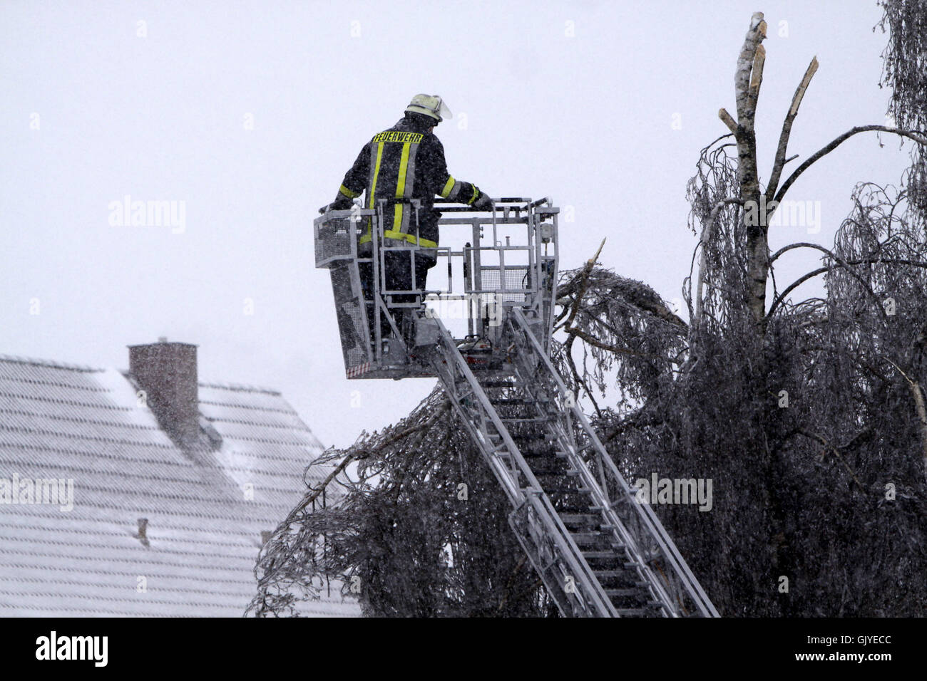 winter fire brigade fireman Stock Photo - Alamy