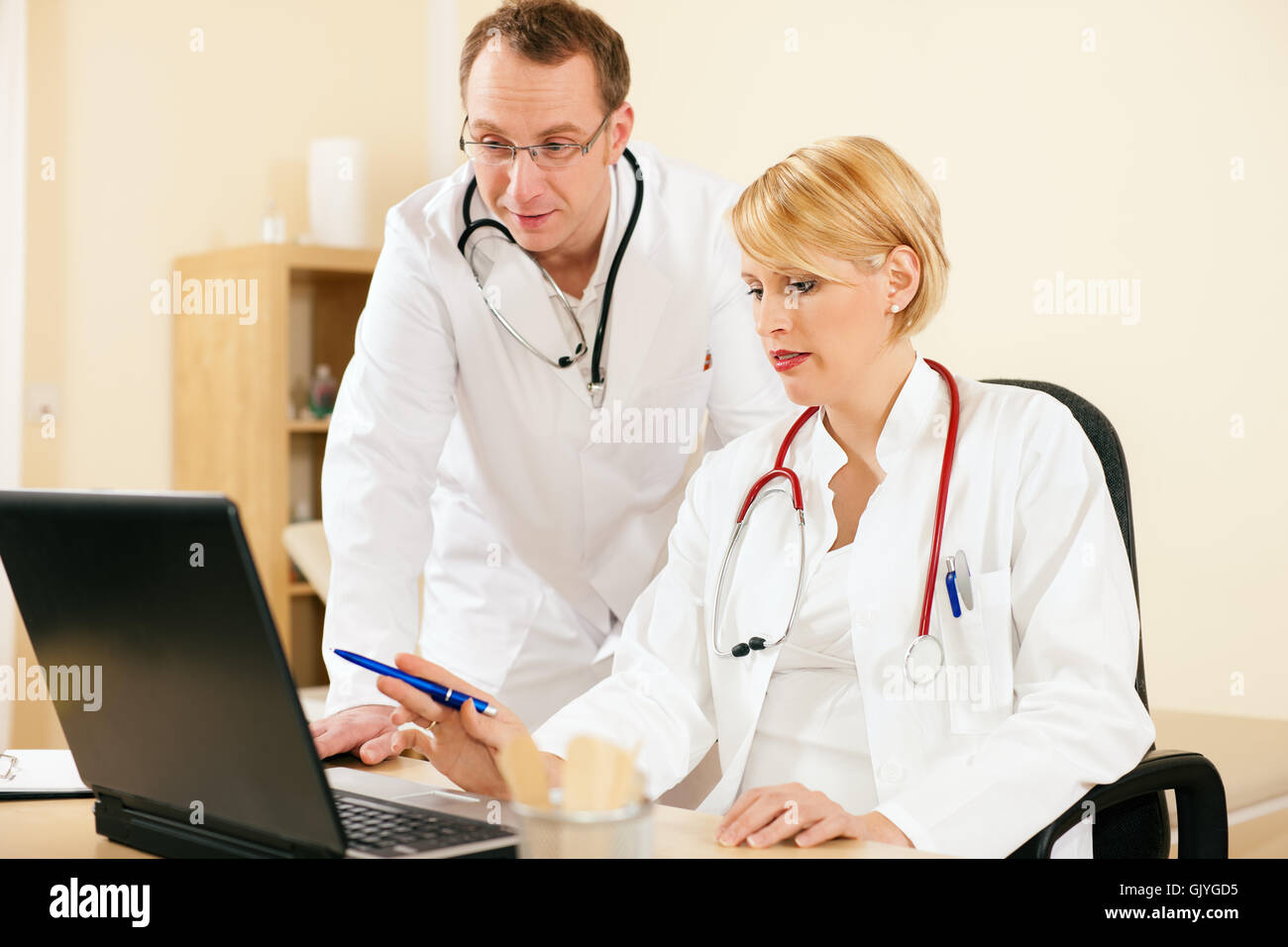 doctors discussing lab results Stock Photo - Alamy