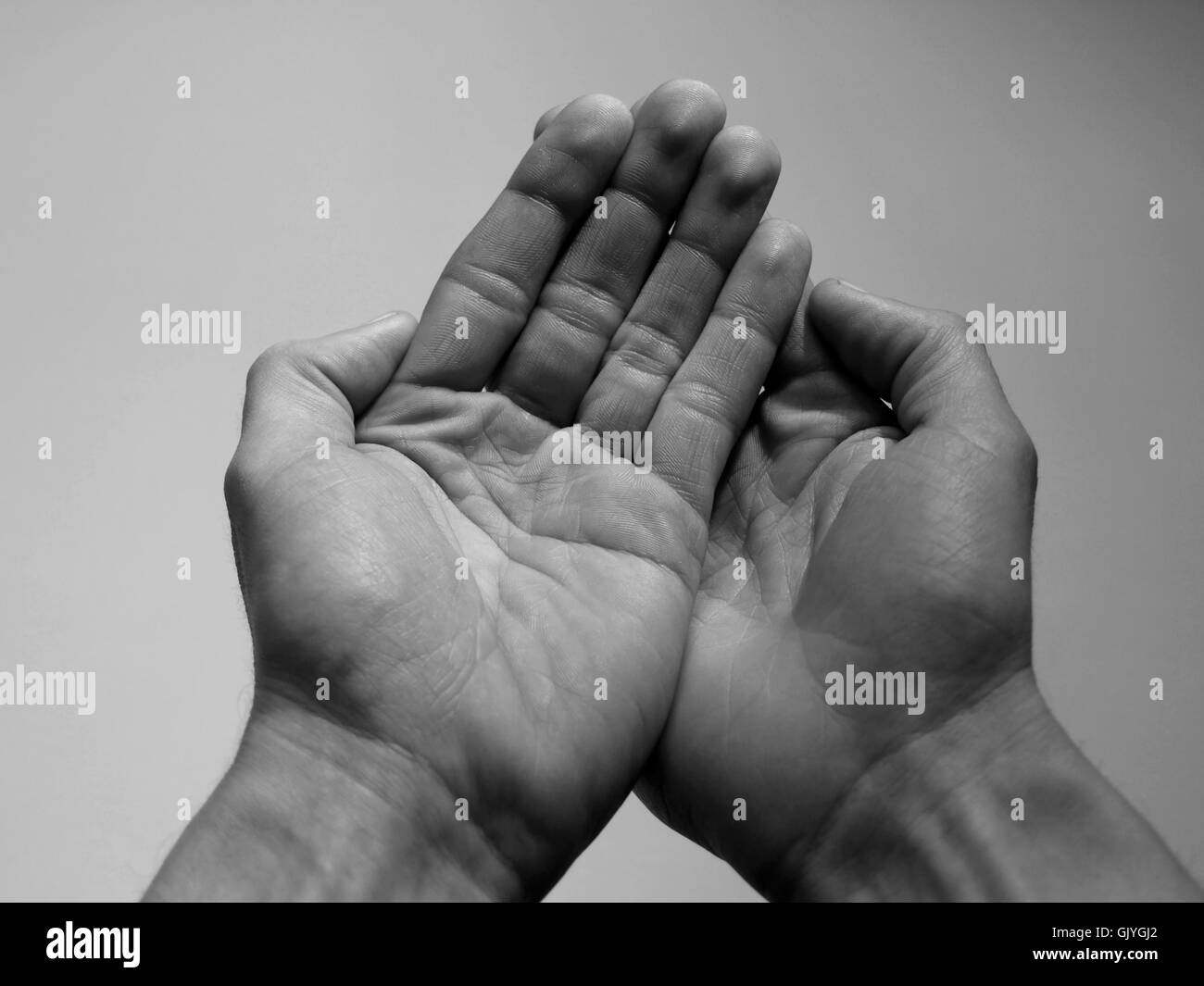 hand gesture donate Stock Photo - Alamy
