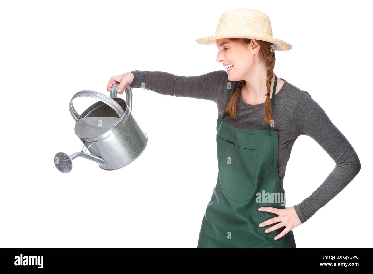gardener with a watering can Stock Photo - Alamy
