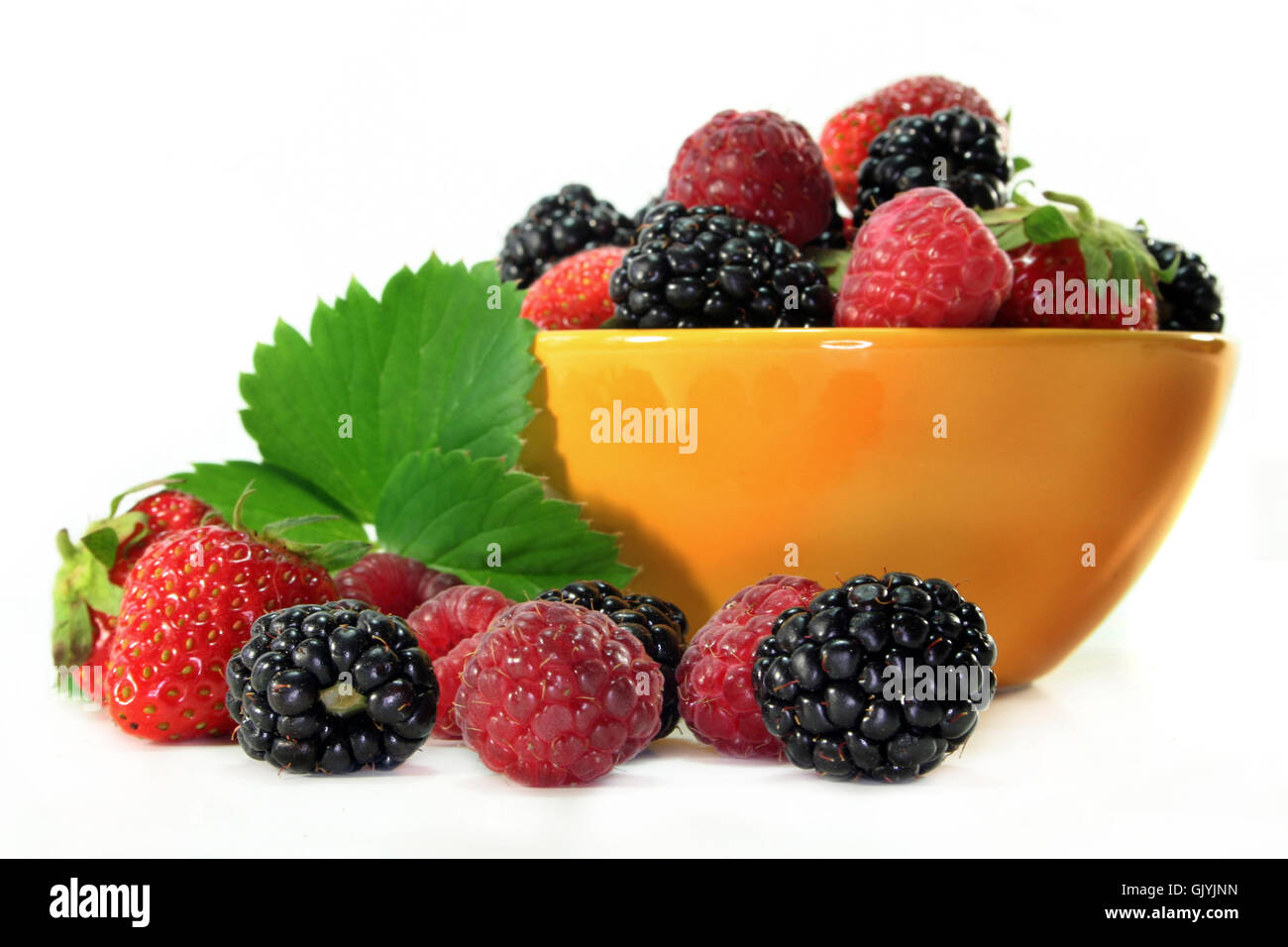 Hand and berry Cut Out Stock Images & Pictures - Alamy