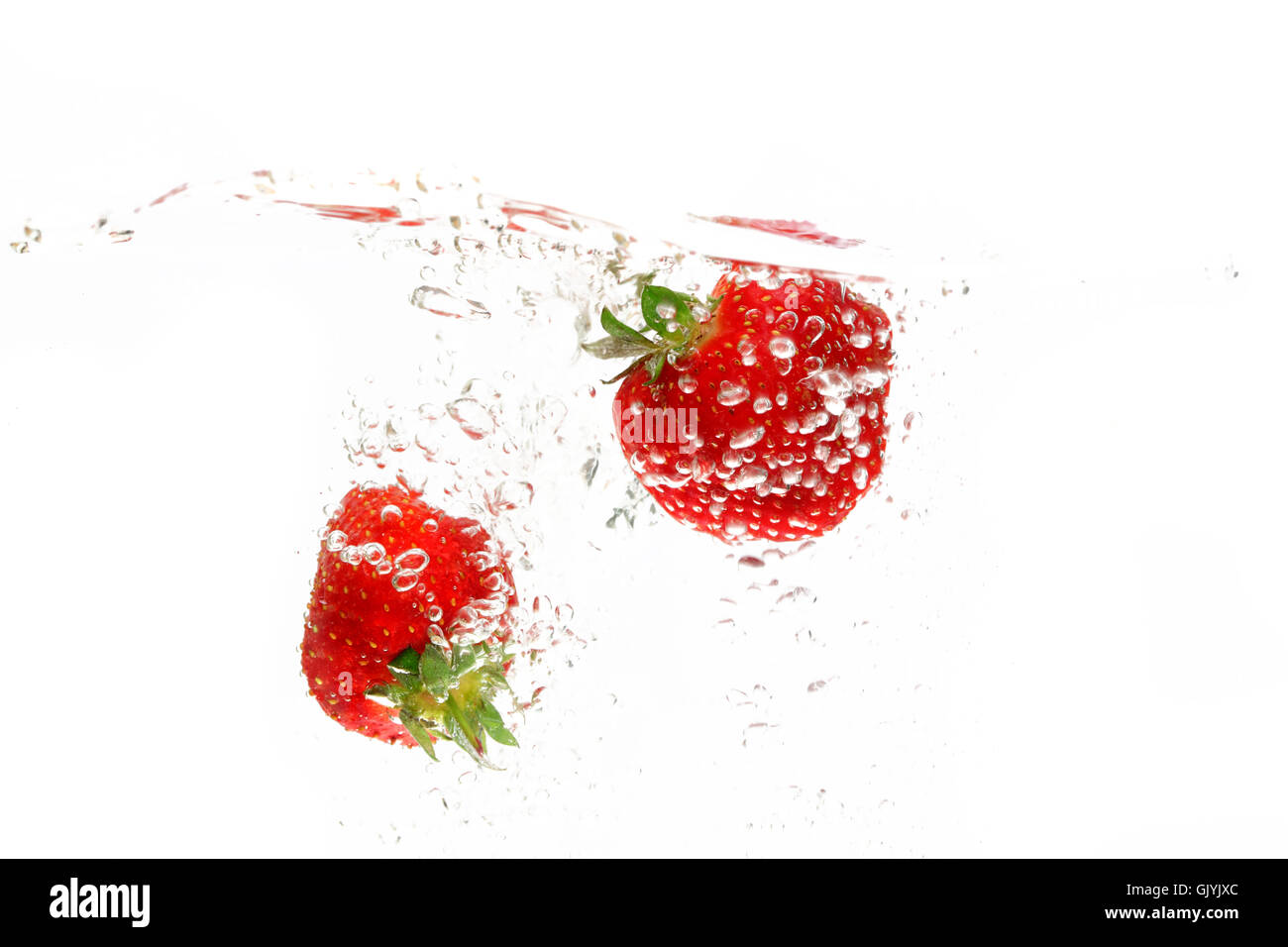 strawberry in water Stock Photo - Alamy