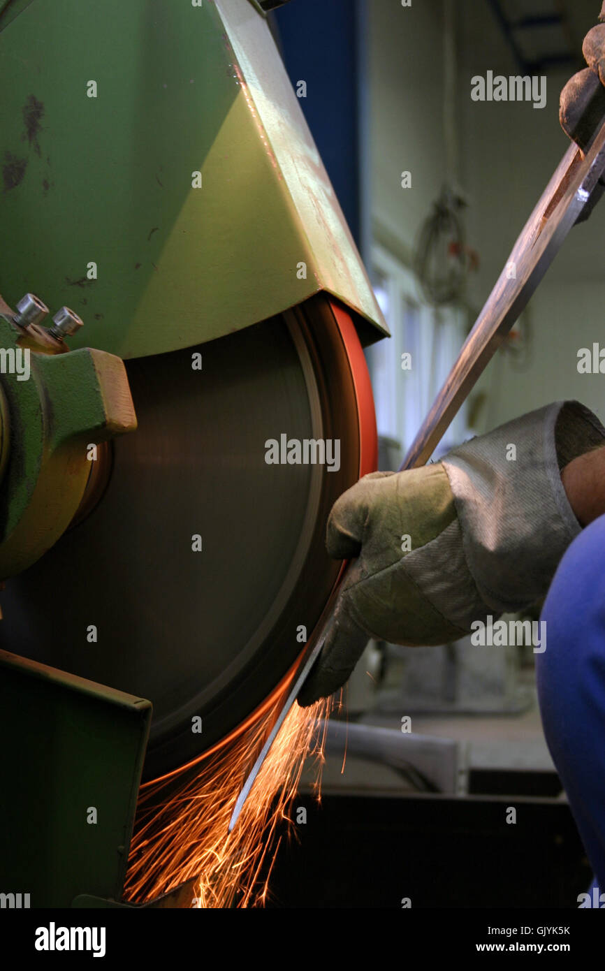 industry production grind Stock Photo - Alamy