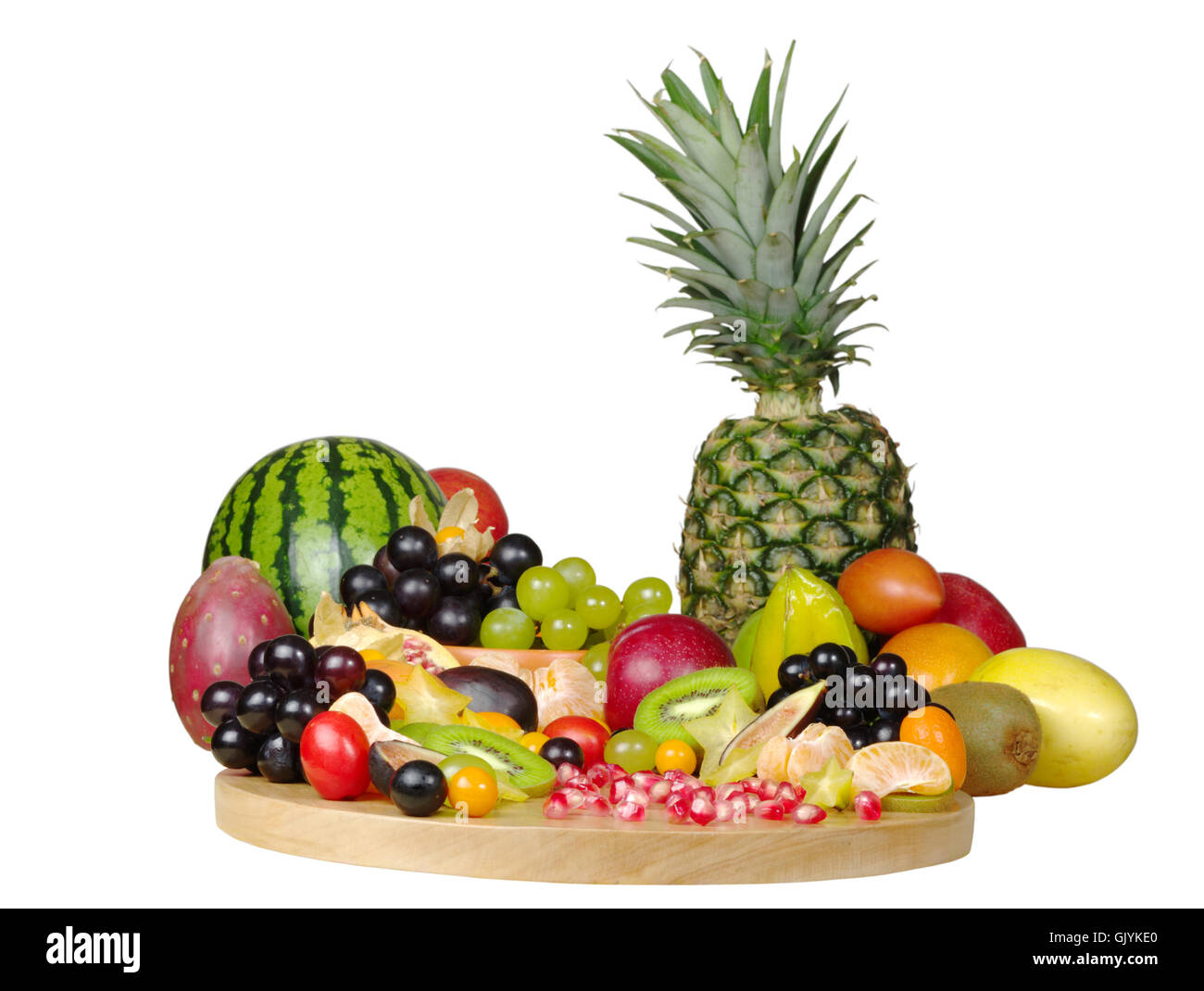 tropical fruits on wood panel Stock Photo - Alamy