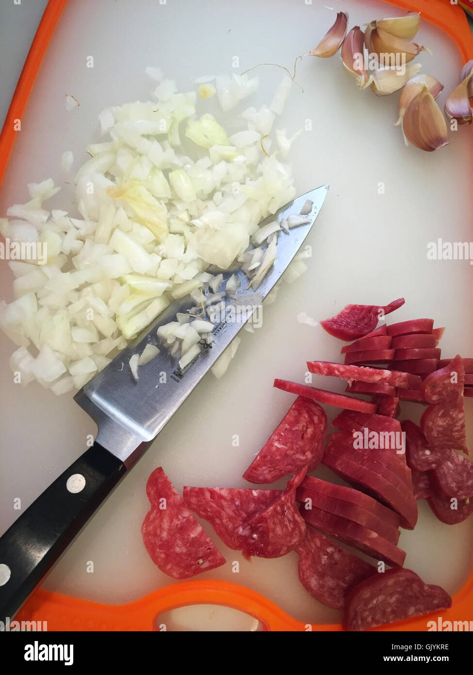 Cutting board, knife and chopped Ingredients Stock Photo - Alamy