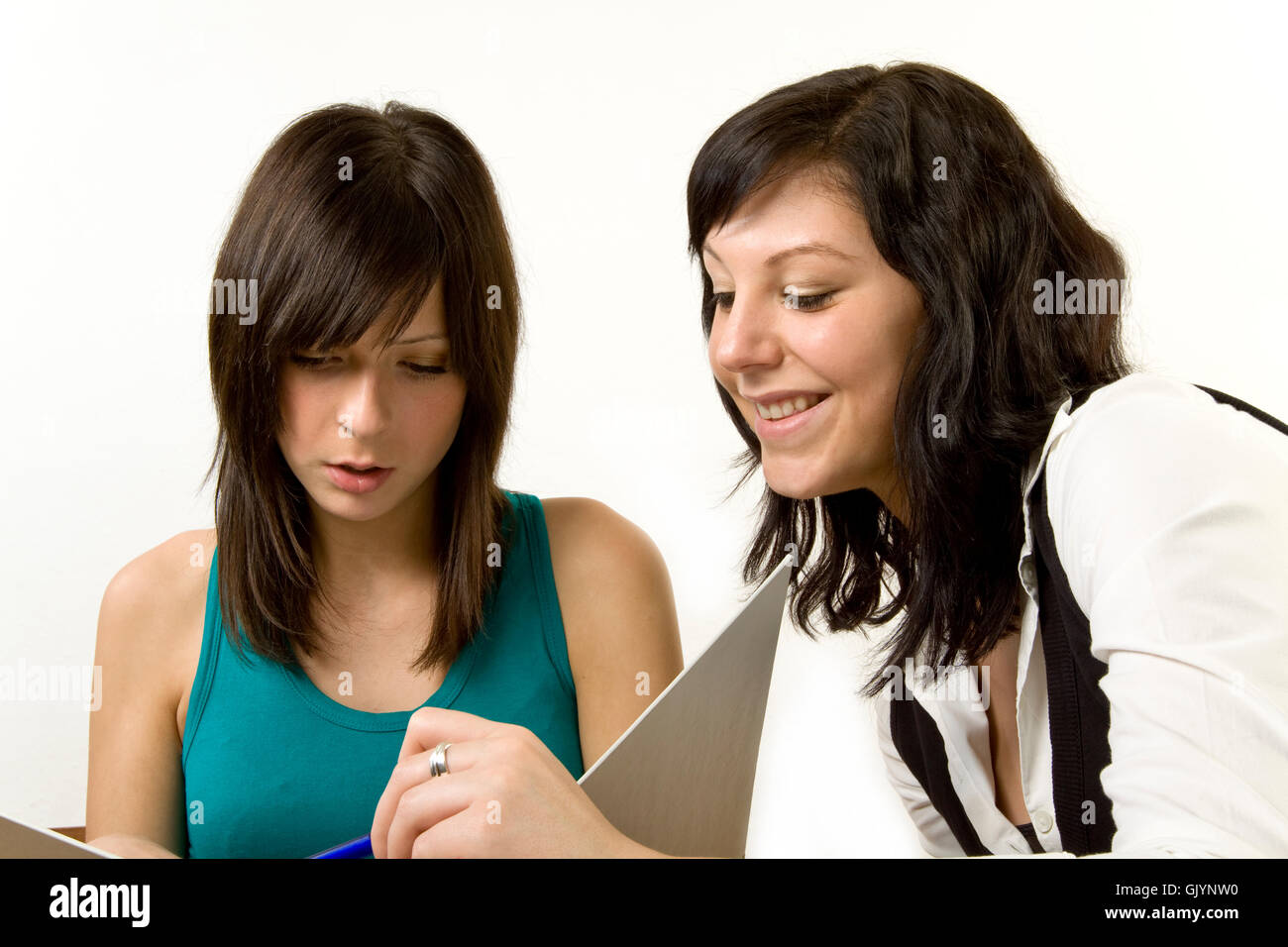 young women discuss tasks Stock Photo - Alamy