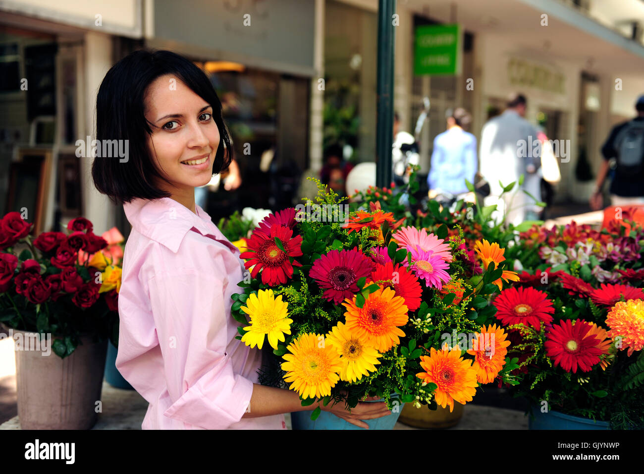 woman with flowers Stock Photo - Alamy