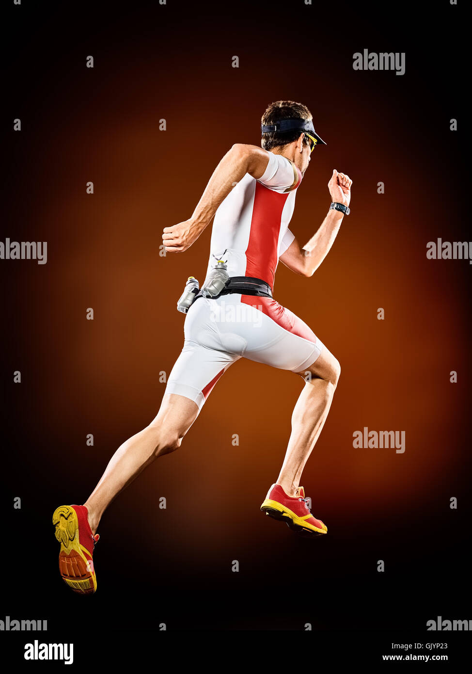 one caucasian man runner running triathlon ironman isolated Stock Photo ...