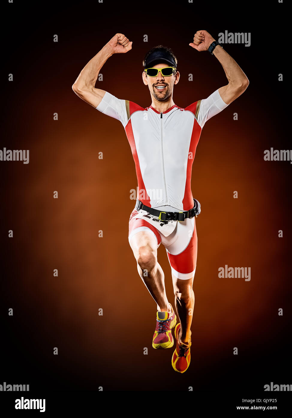 one caucasian man runner running triathlon ironman isolated Stock Photo ...