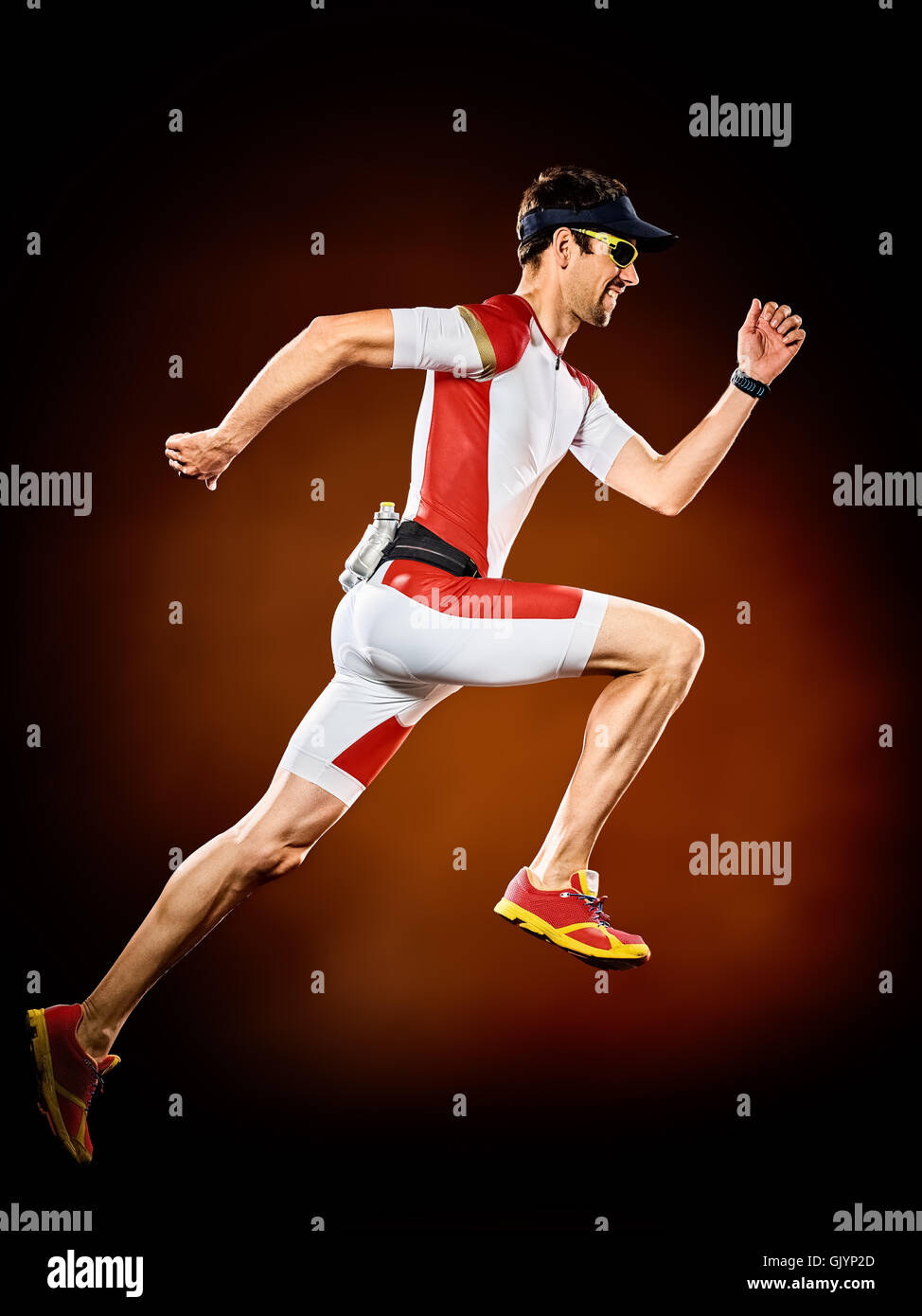 one caucasian man runner running triathlon ironman isolated Stock Photo ...