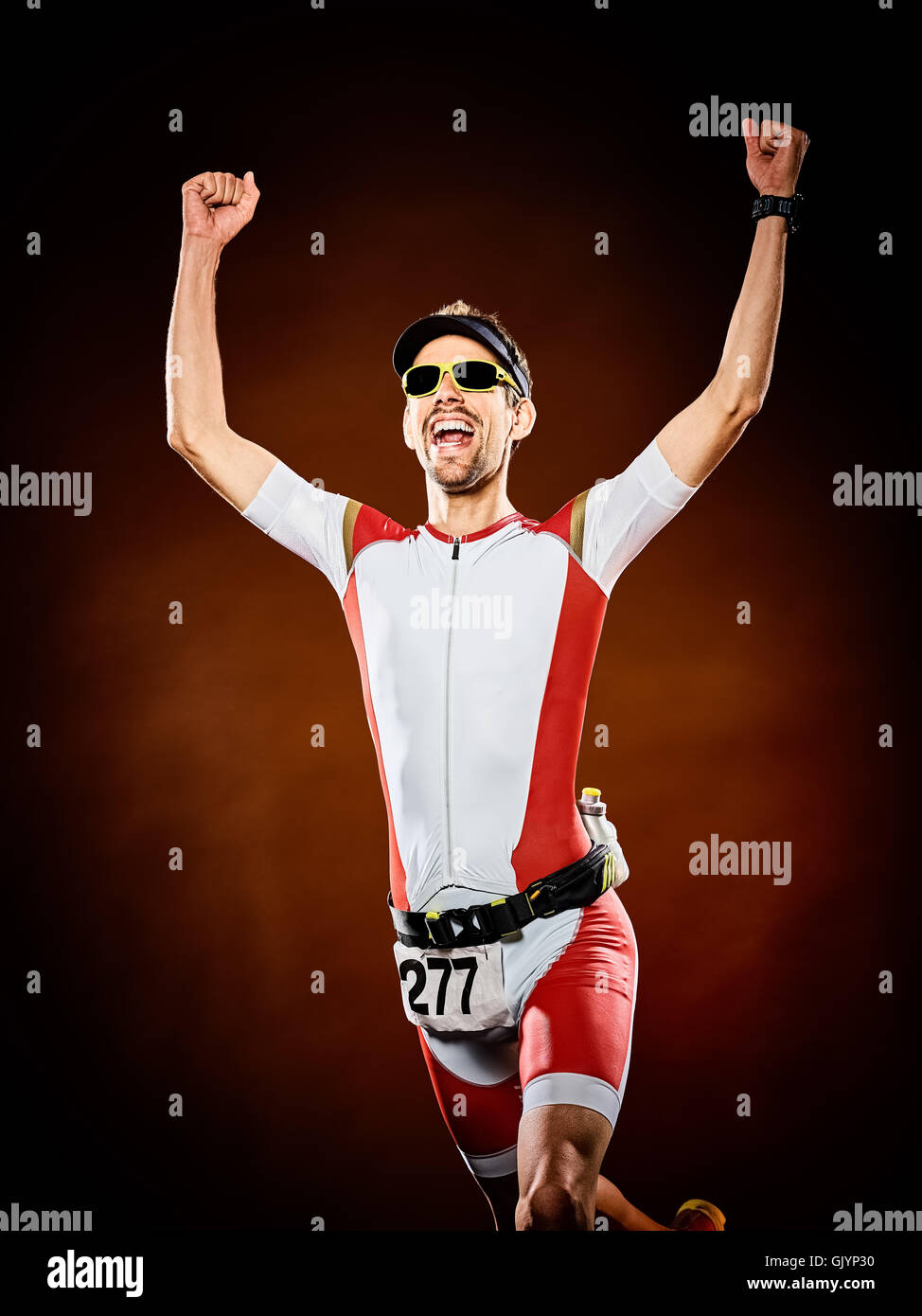 one caucasian man runner running triathlon ironman isolated Stock Photo ...