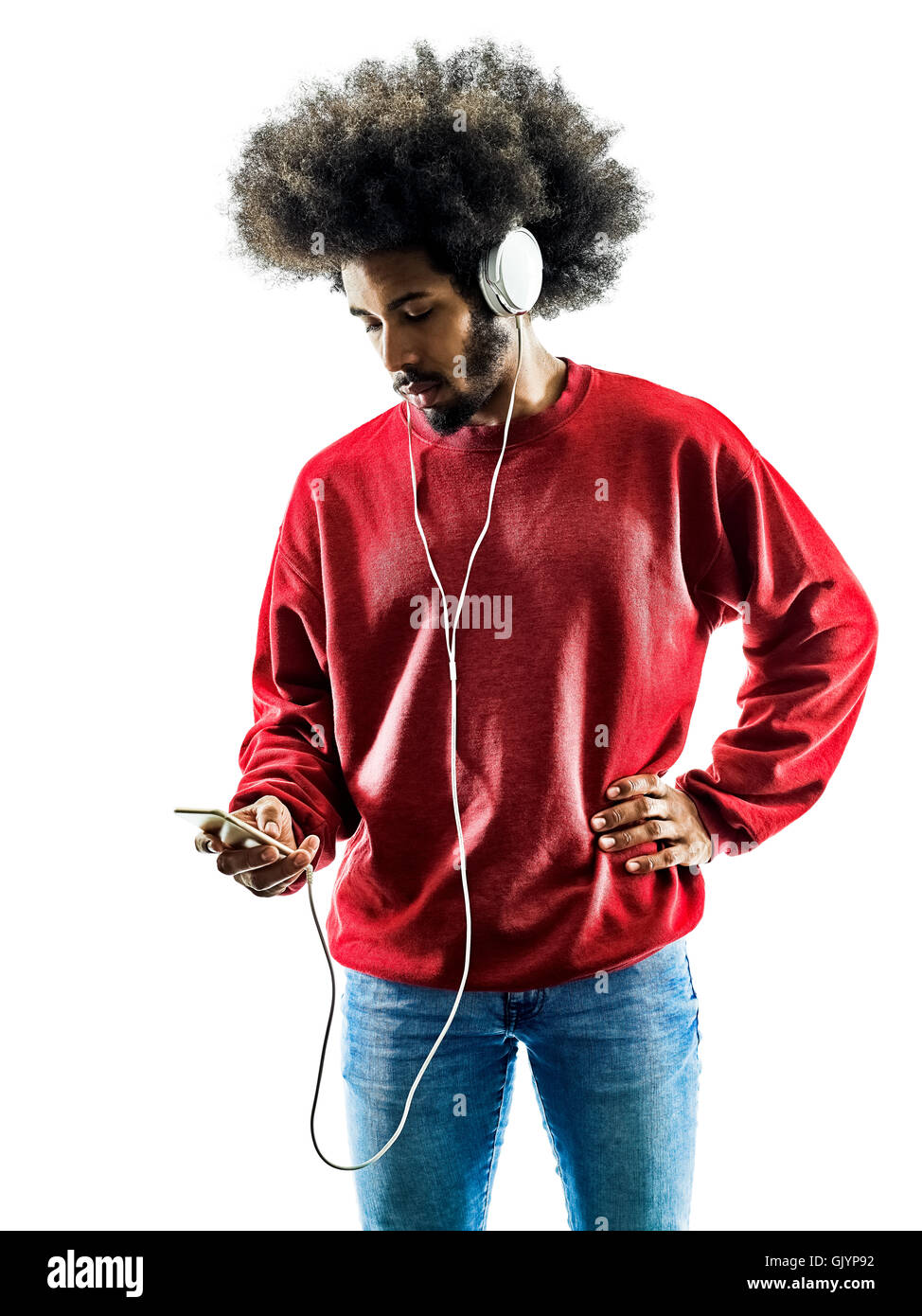 one african man listening music in silhouette isolated on white ...