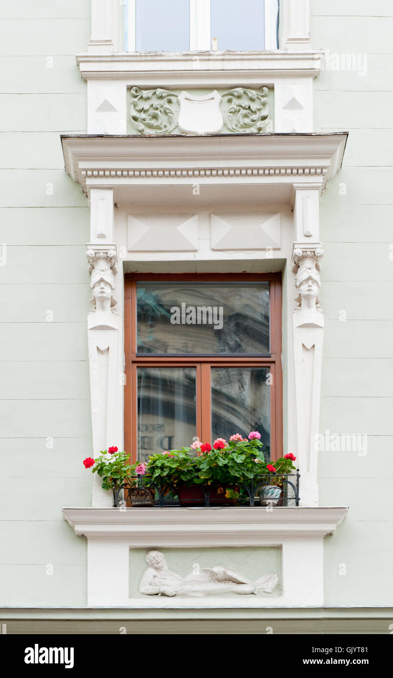 Facade of a building with windows Stock Photo - Alamy