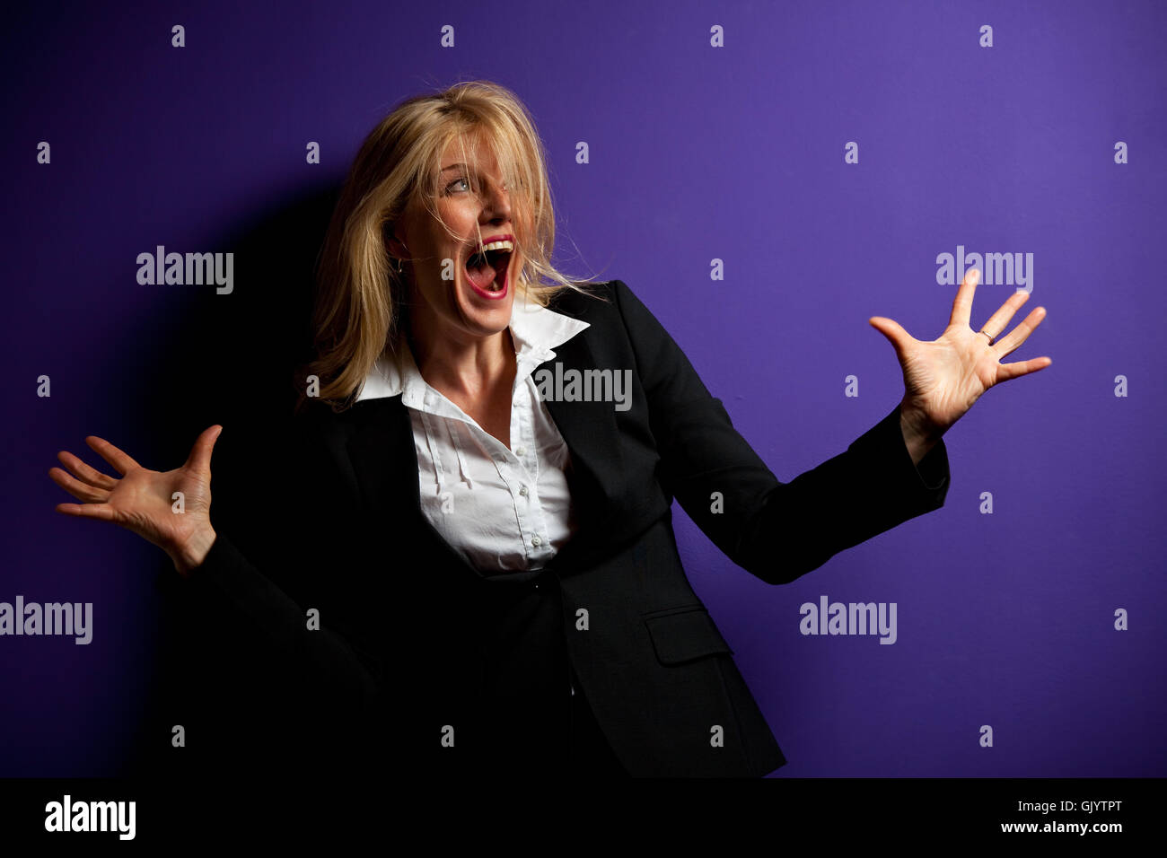 Woman purple dress worried hi-res stock photography and images - Alamy