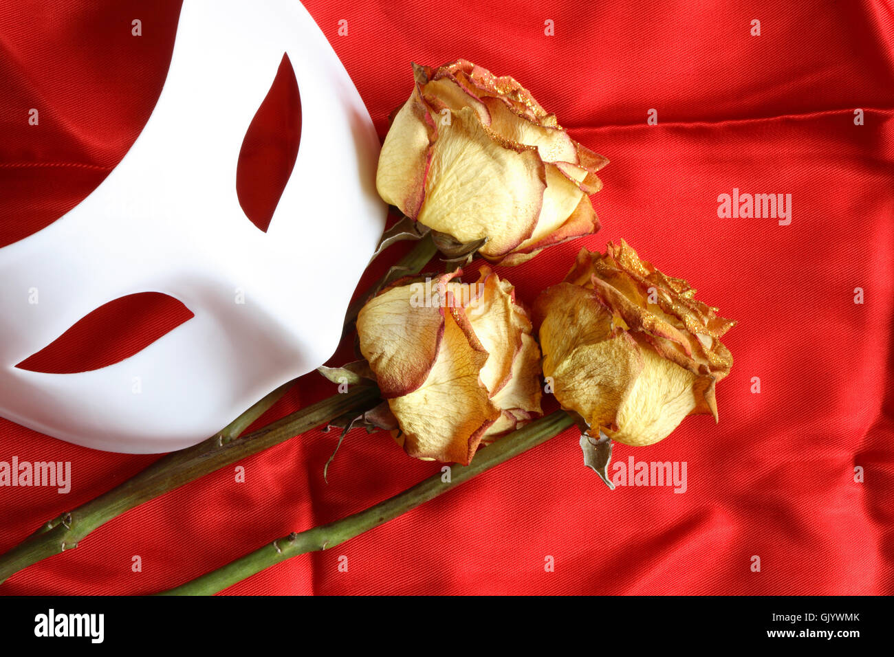 Mask And Roses Stock Photo - Alamy