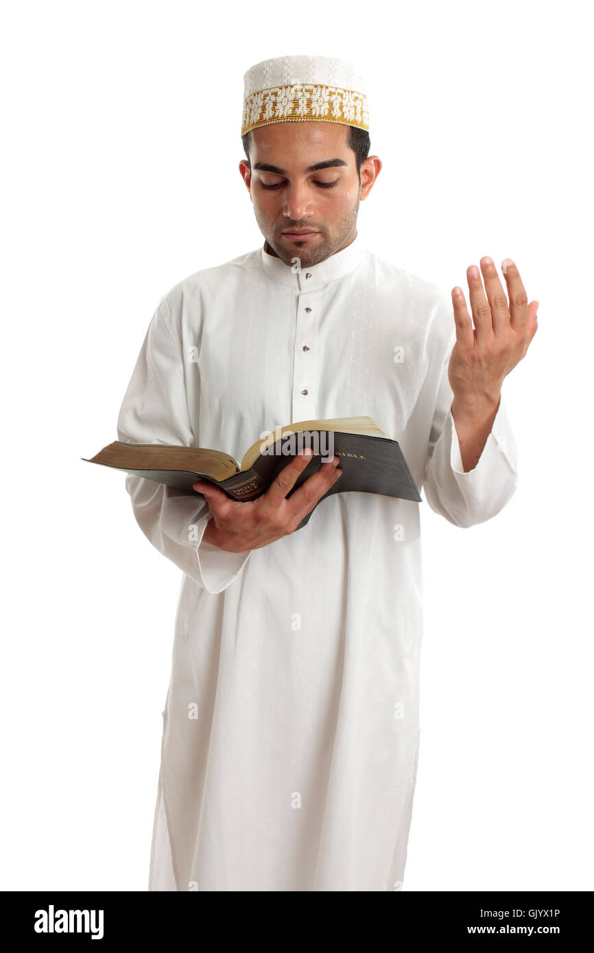 Priest reading from bible hi-res stock photography and images - Alamy