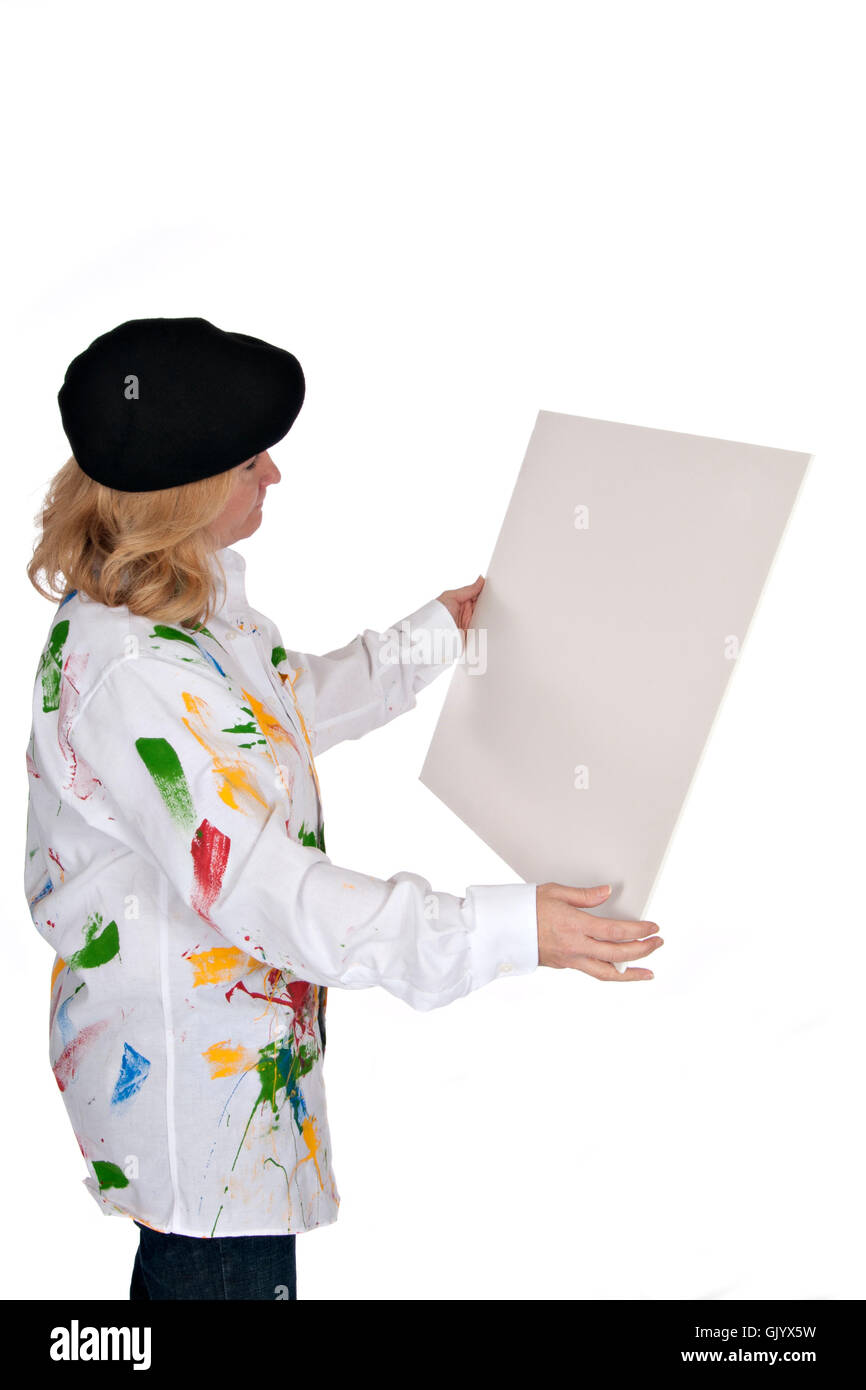 woman looking at poster Stock Photo - Alamy