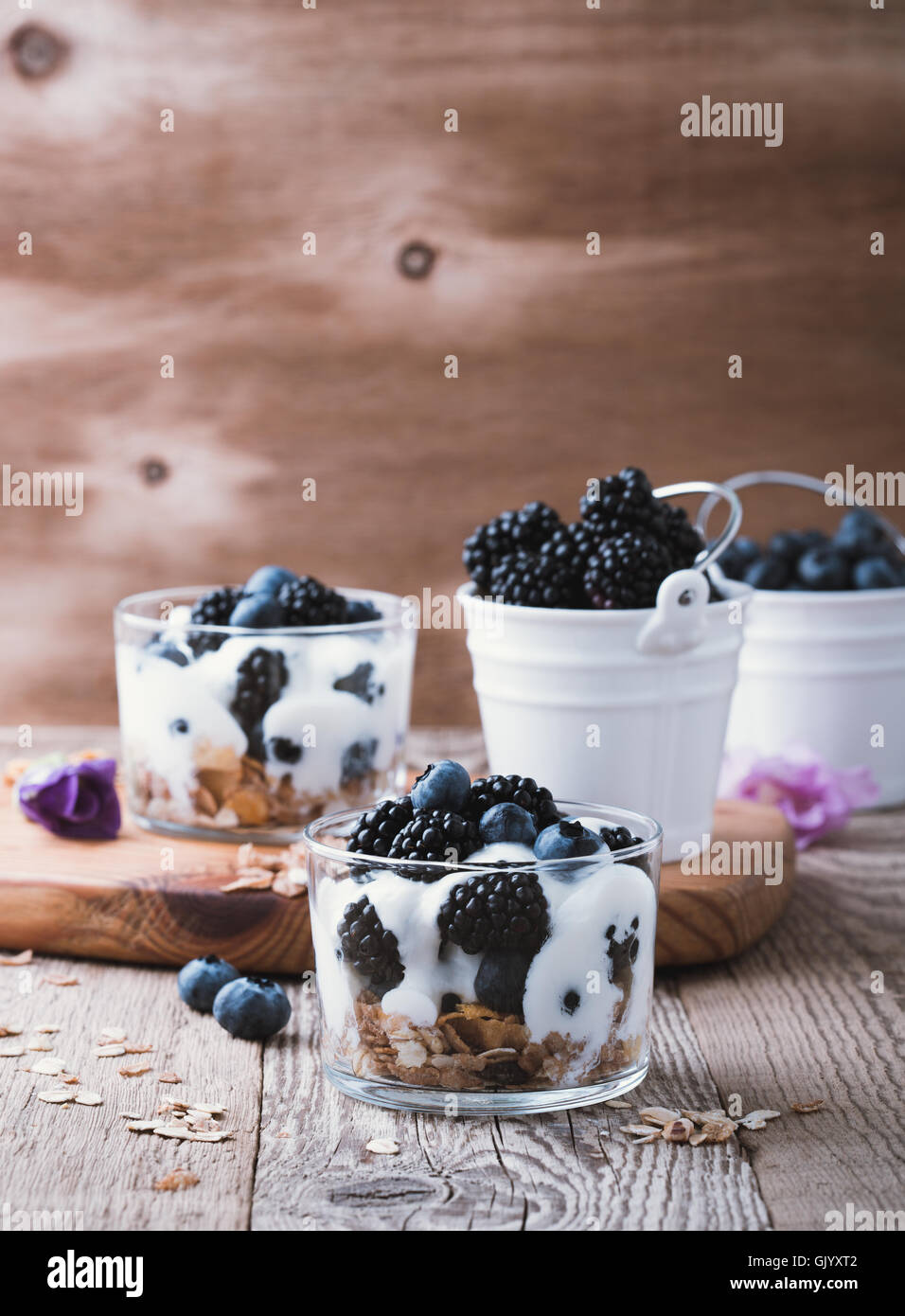 Healthy breakfast with homemade granola and fresh berries, yogurt with ...
