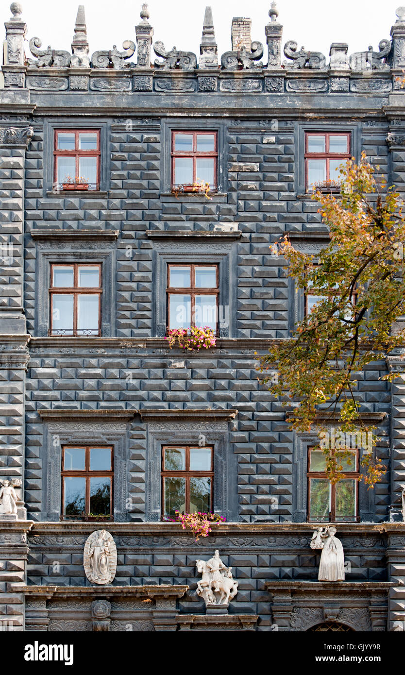 Facade of a building with windows Stock Photo - Alamy