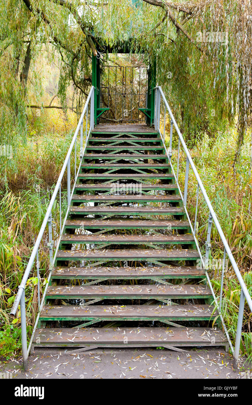 Iron ladder in summer house above a reservoir Stock Photo - Alamy