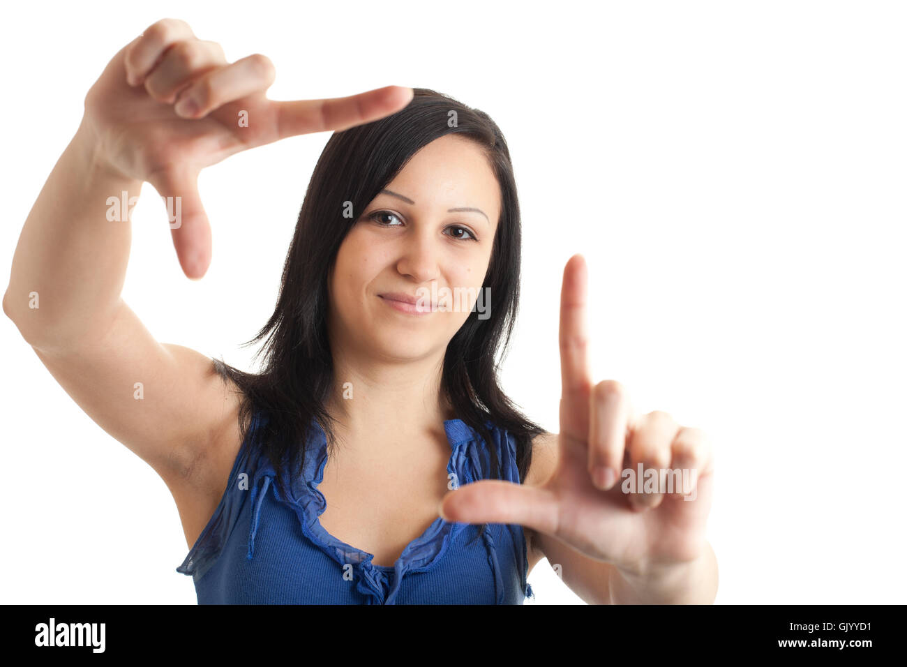 young woman framing face Stock Photo - Alamy