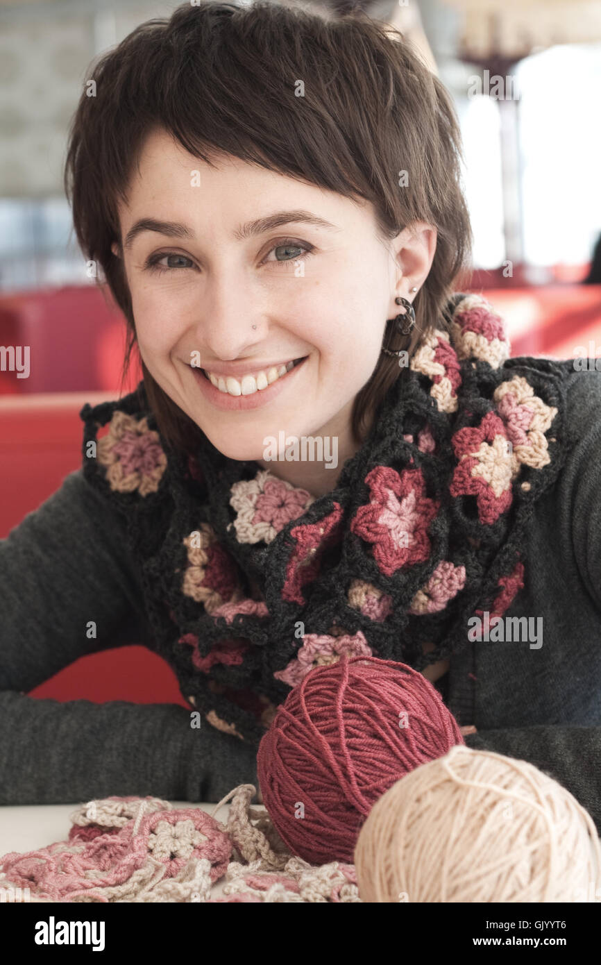 Portrait of a young beautiful girl with knitting Stock Photo - Alamy