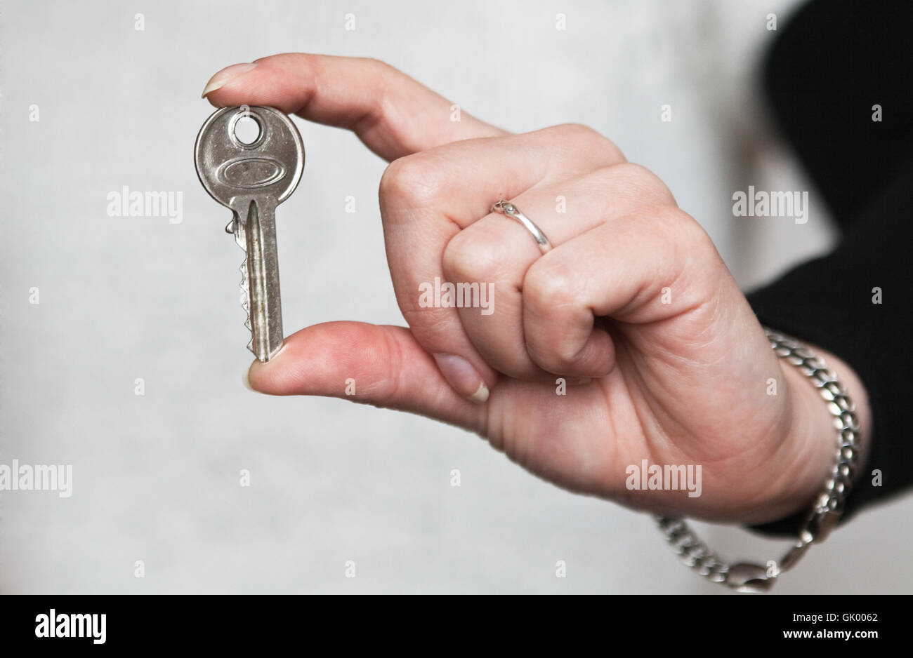 Key in hand Stock Photo - Alamy