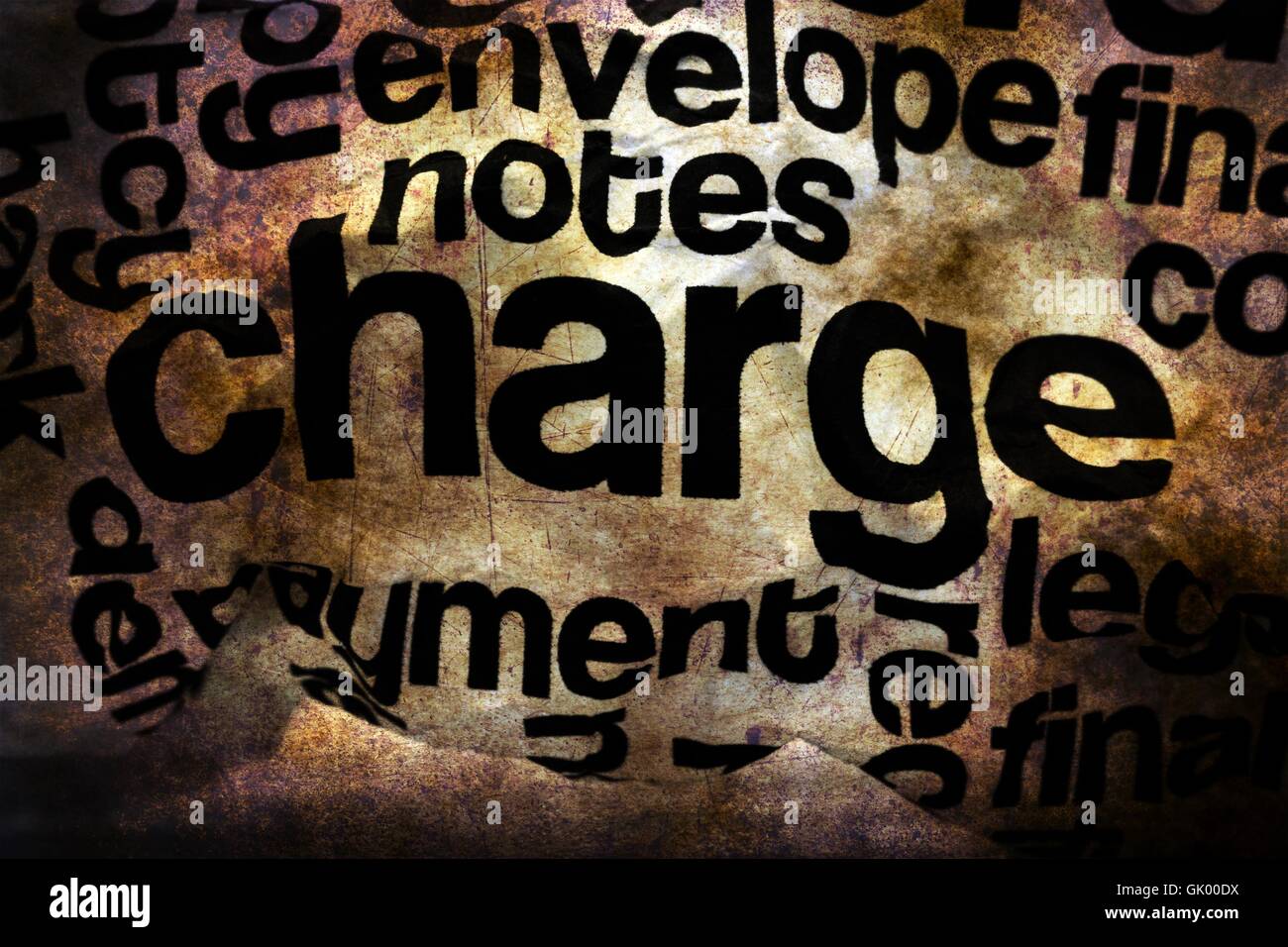 Charge text on crinkled paper grunge concept Stock Photo - Alamy