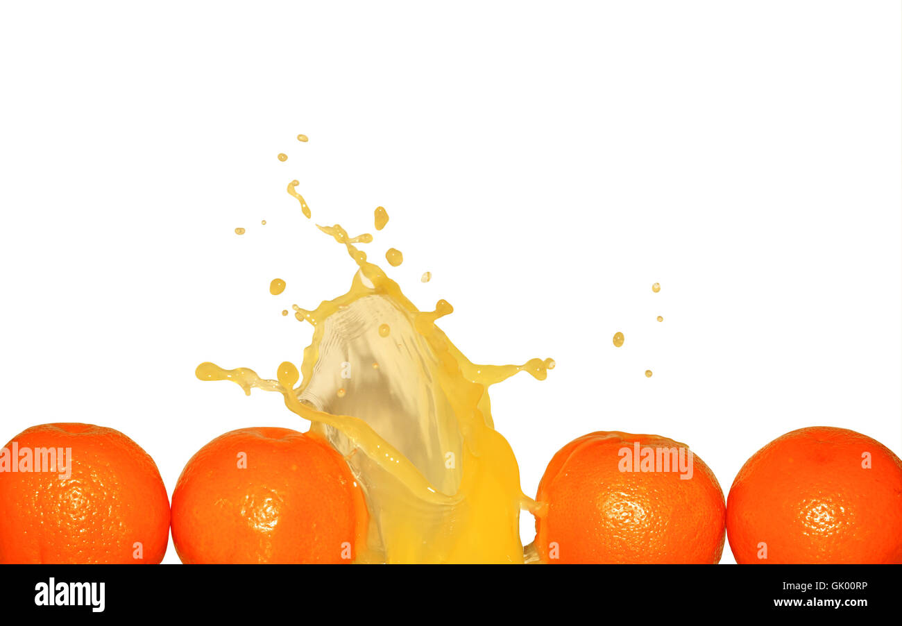 Splashing Orange Juice On White Stock Photo - Alamy