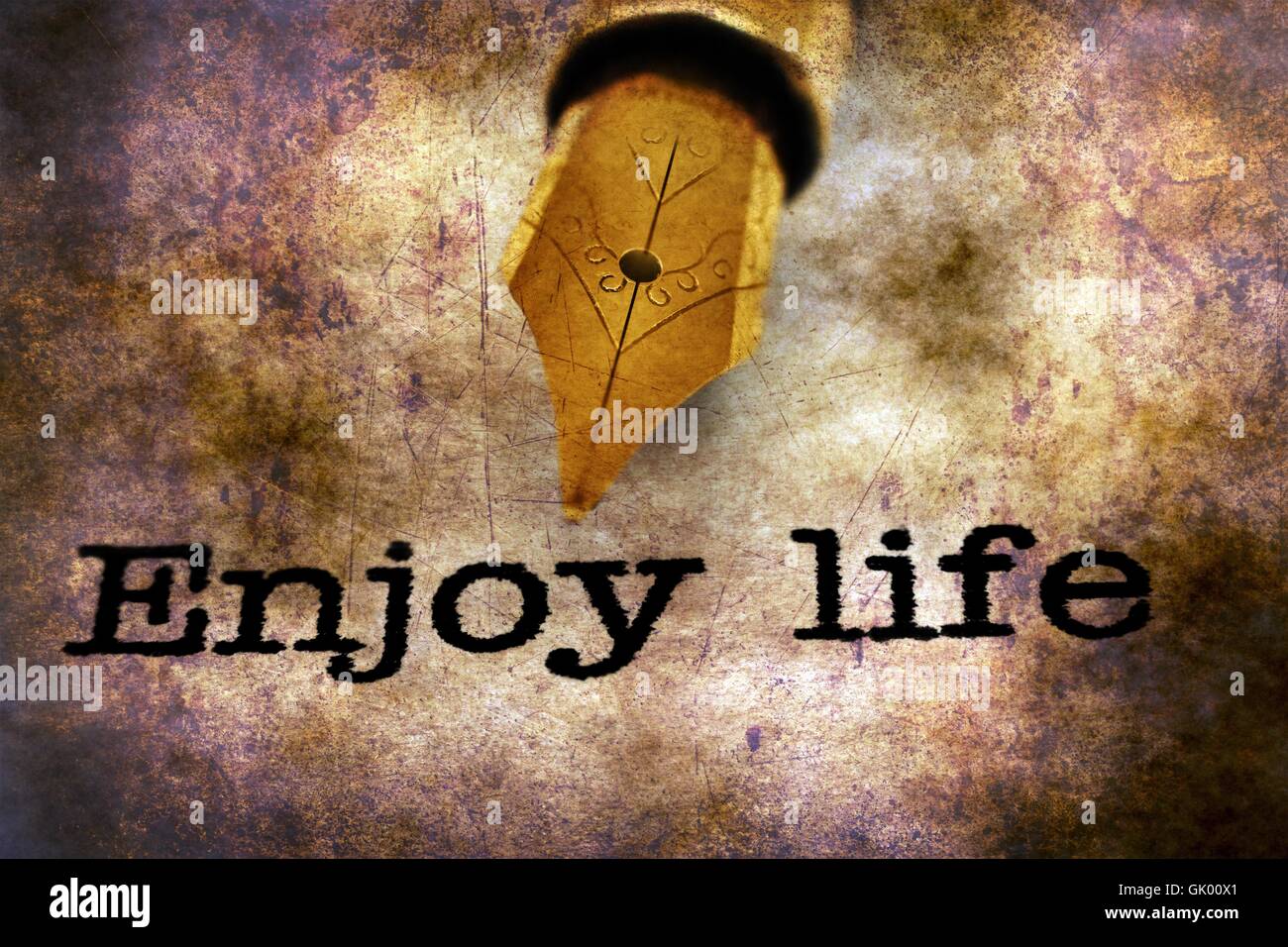Enjoy life text and fountain pen Stock Photo - Alamy