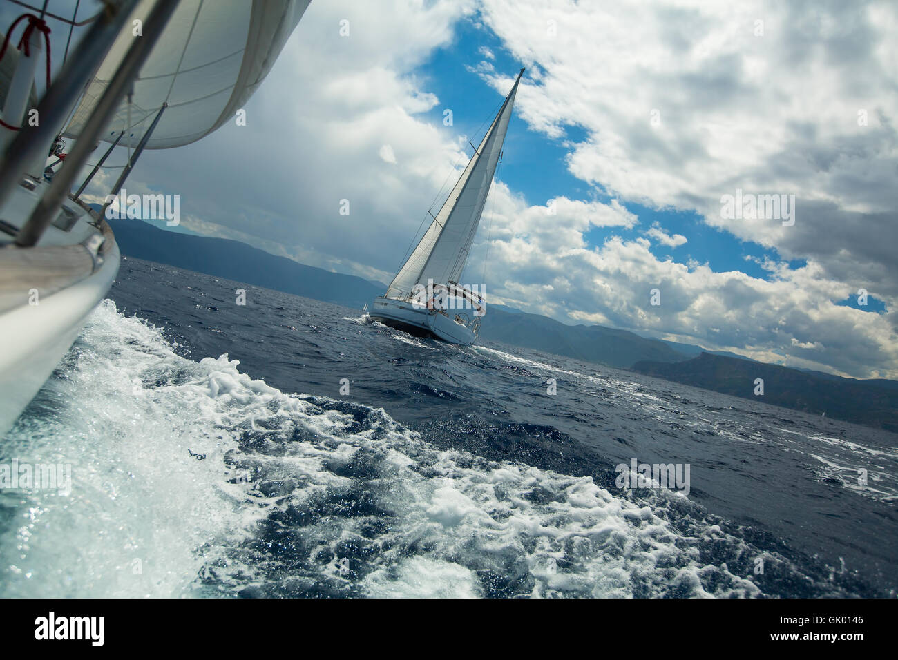 Sailing over the ocean waves in stormy weather Stock Photo - Alamy