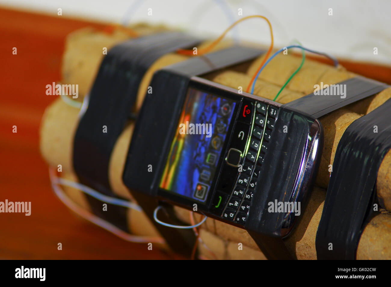 cellphone tied with tape to a set of explosives Stock Photo - Alamy
