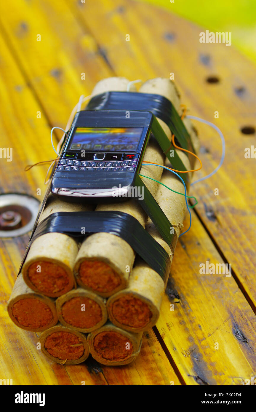 terrorist bomb made with explosives and a cellphone Stock Photo - Alamy
