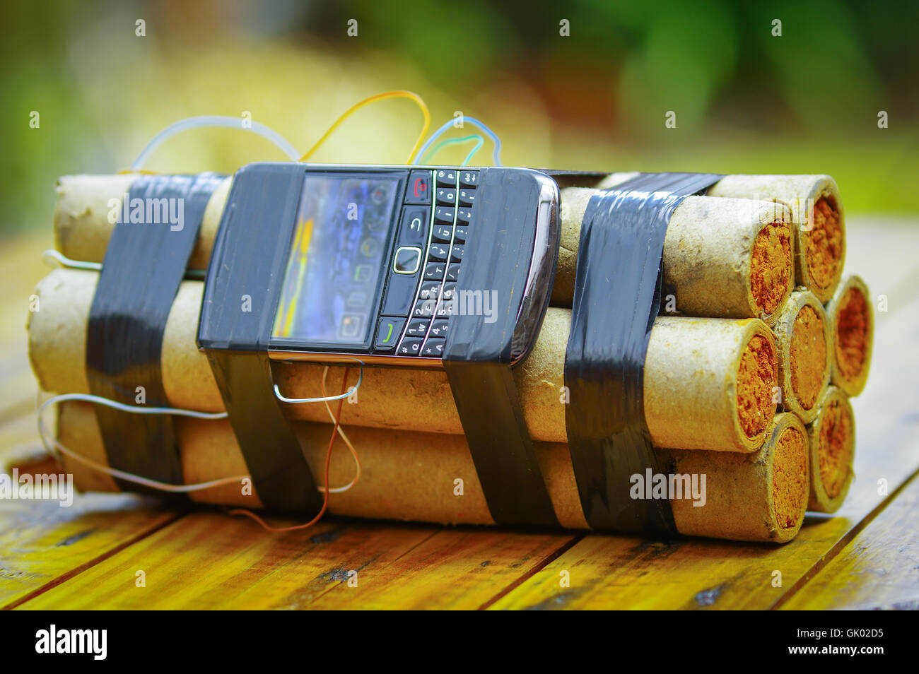 cellphone tied to a terrorist bomb laying on the ground Stock Photo - Alamy