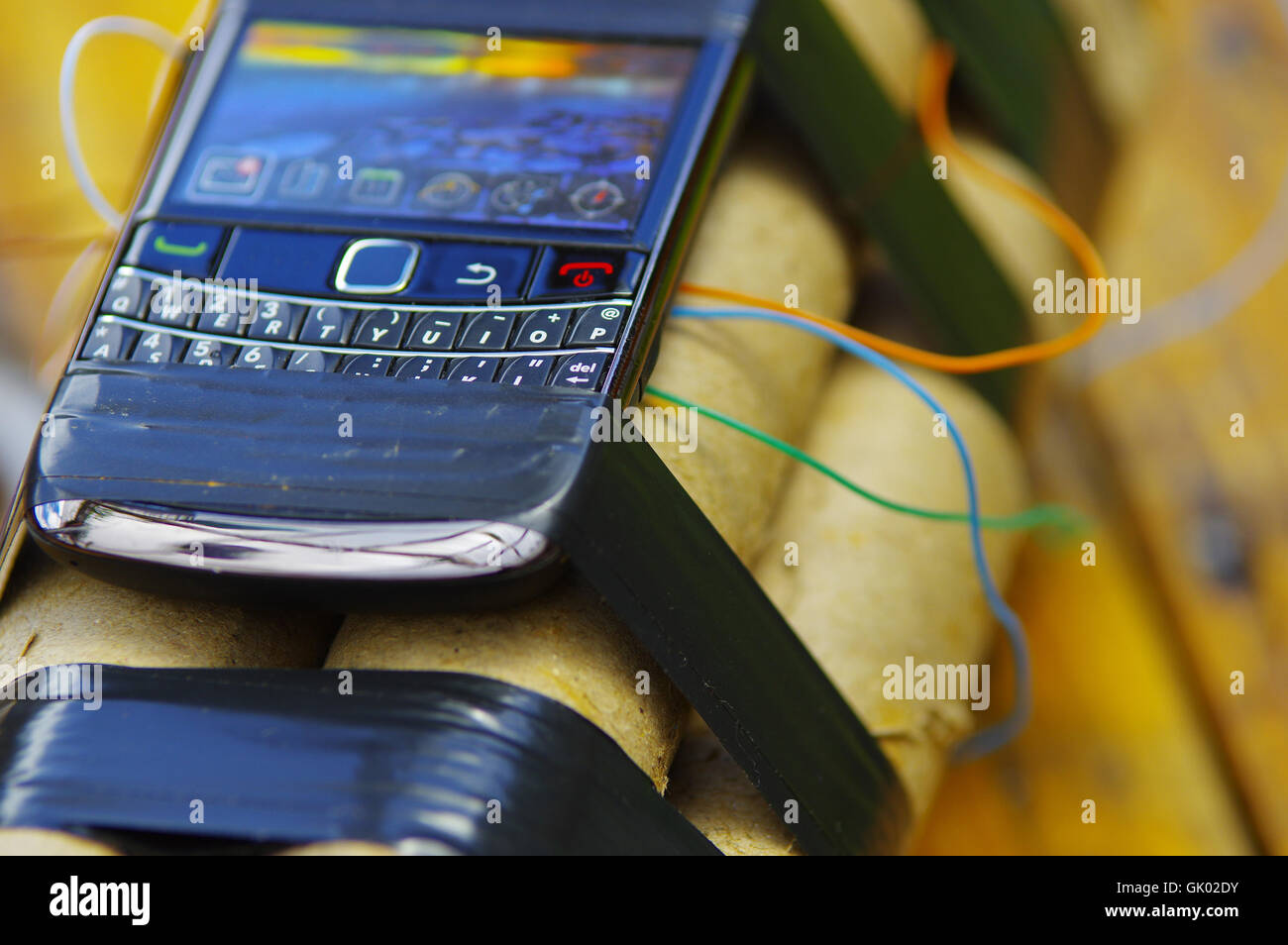 set of explosives with a cellphone as detonator Stock Photo - Alamy