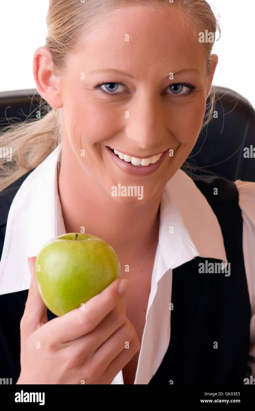 Woman bit green apple hi-res stock photography and images - Alamy