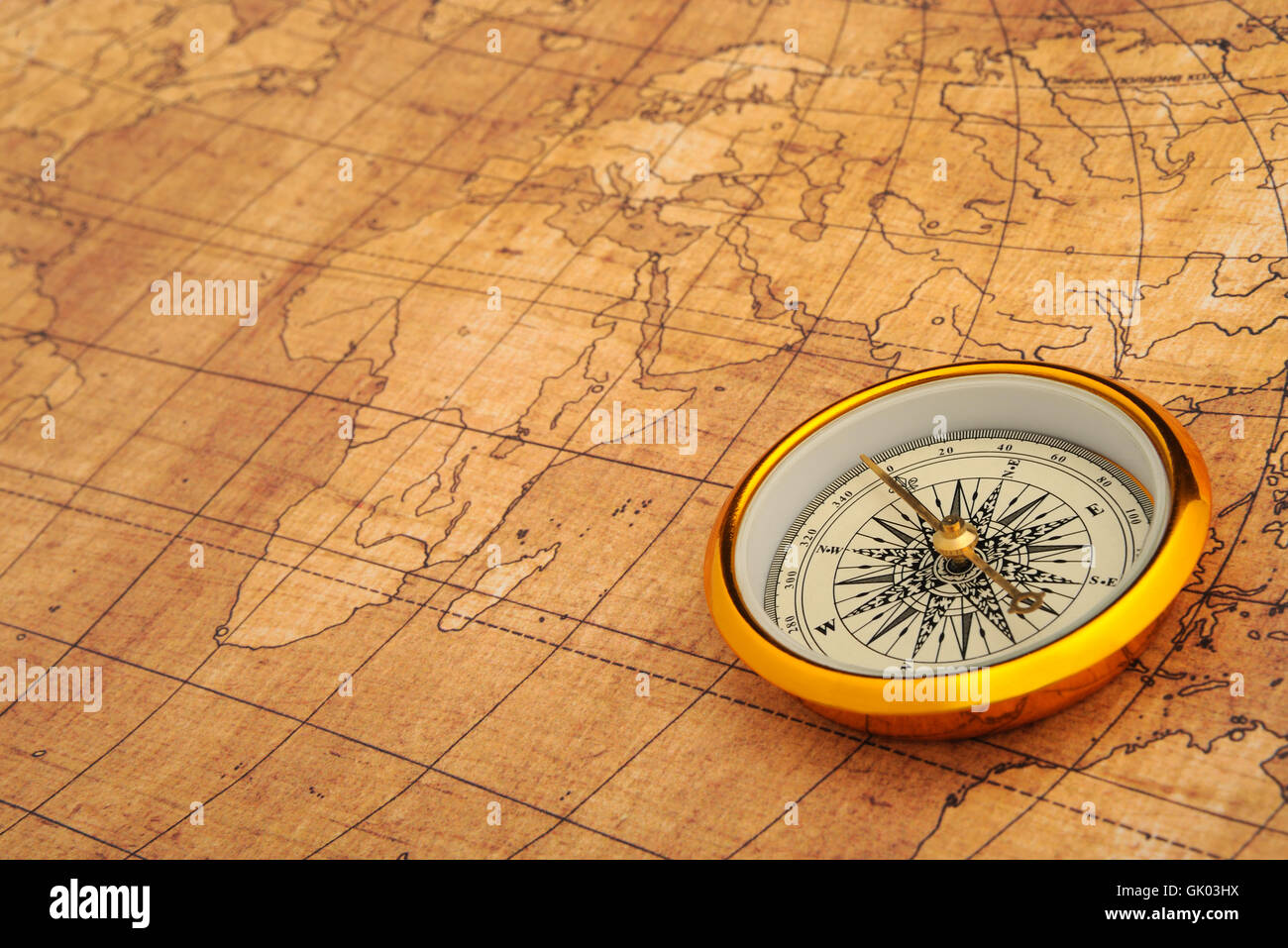 Compass on old map Stock Photo - Alamy